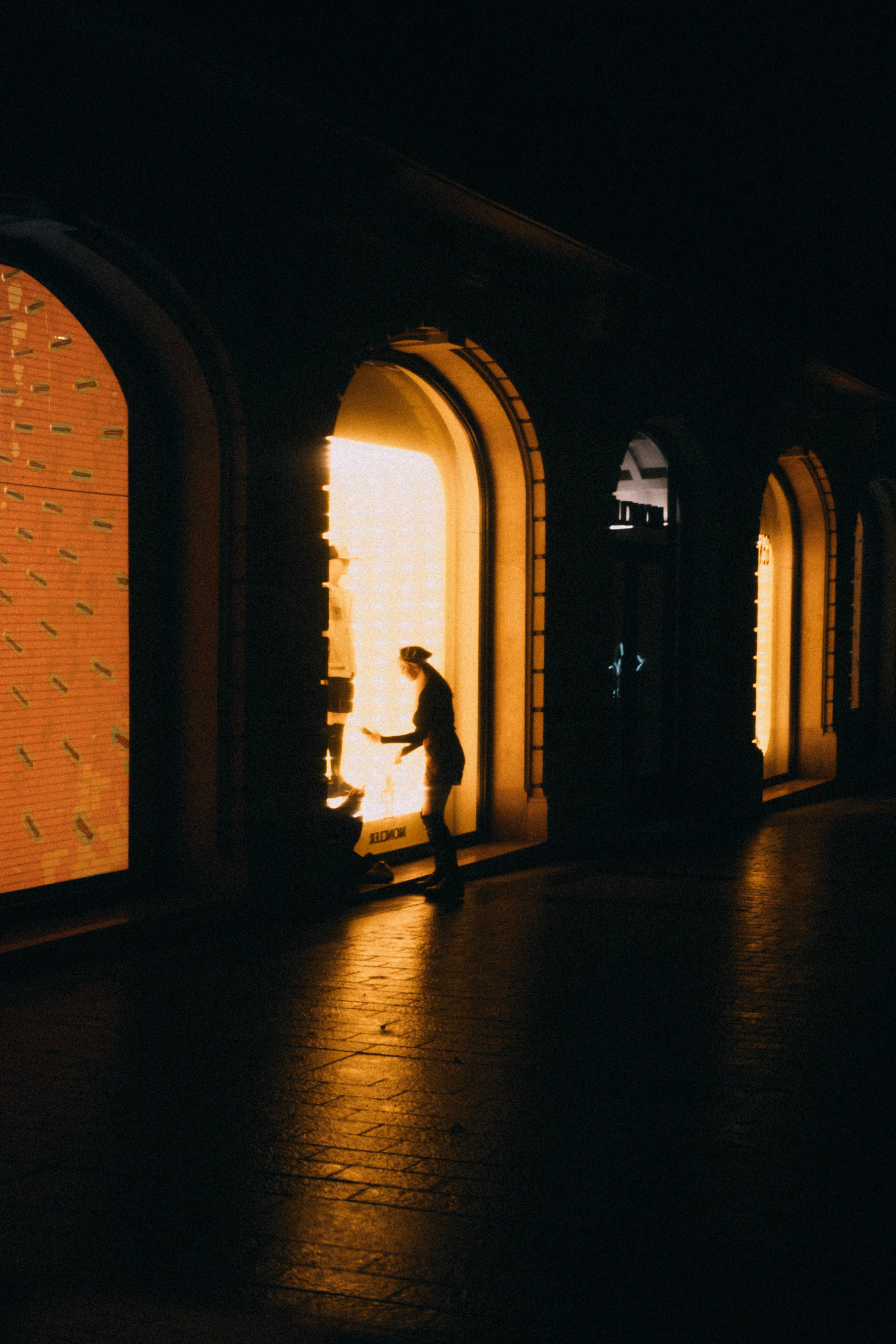 Woman Standing in Front of Show Window · Free Stock Photo
