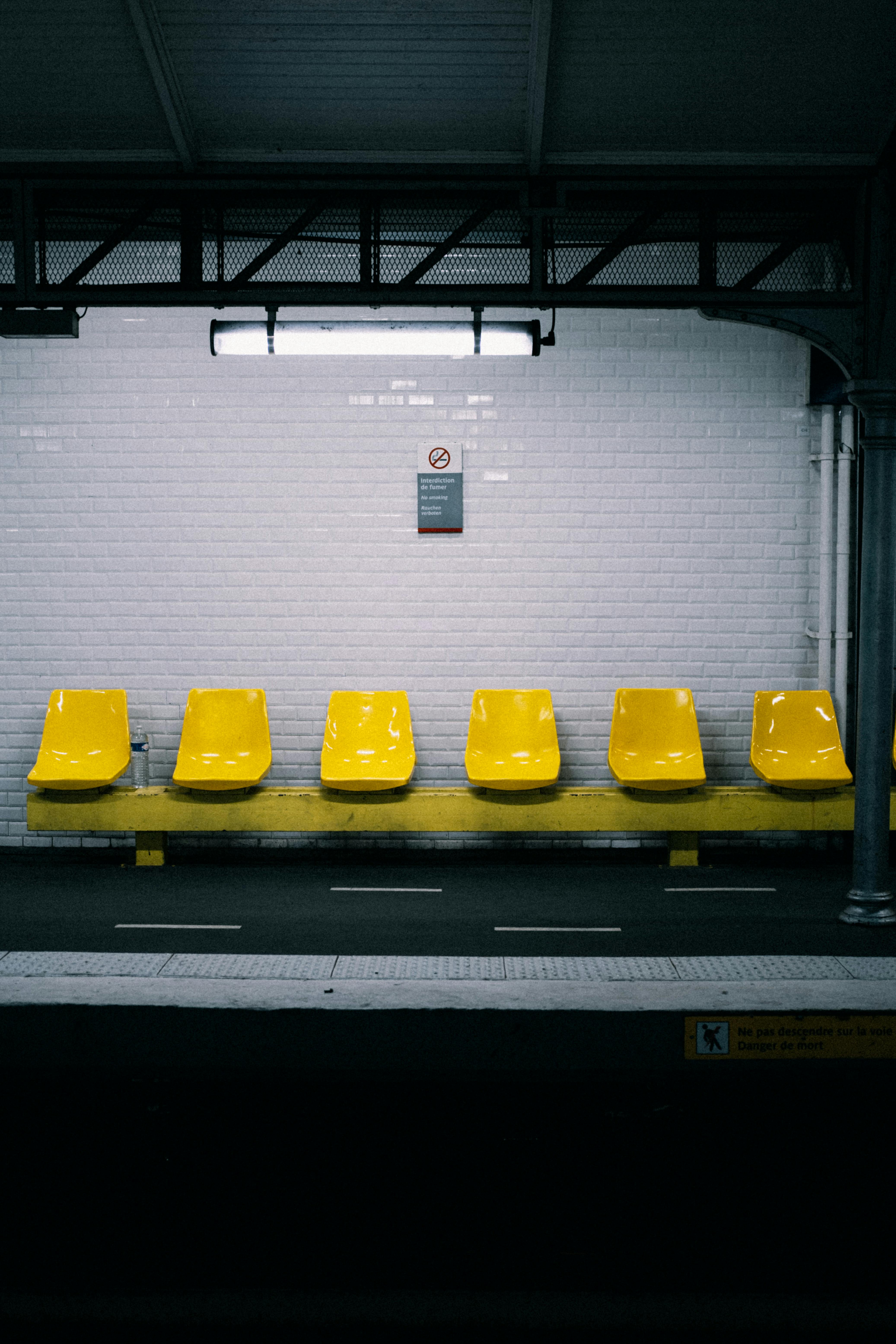 Rows of Seats in a Subway Station · Free Stock Photo
