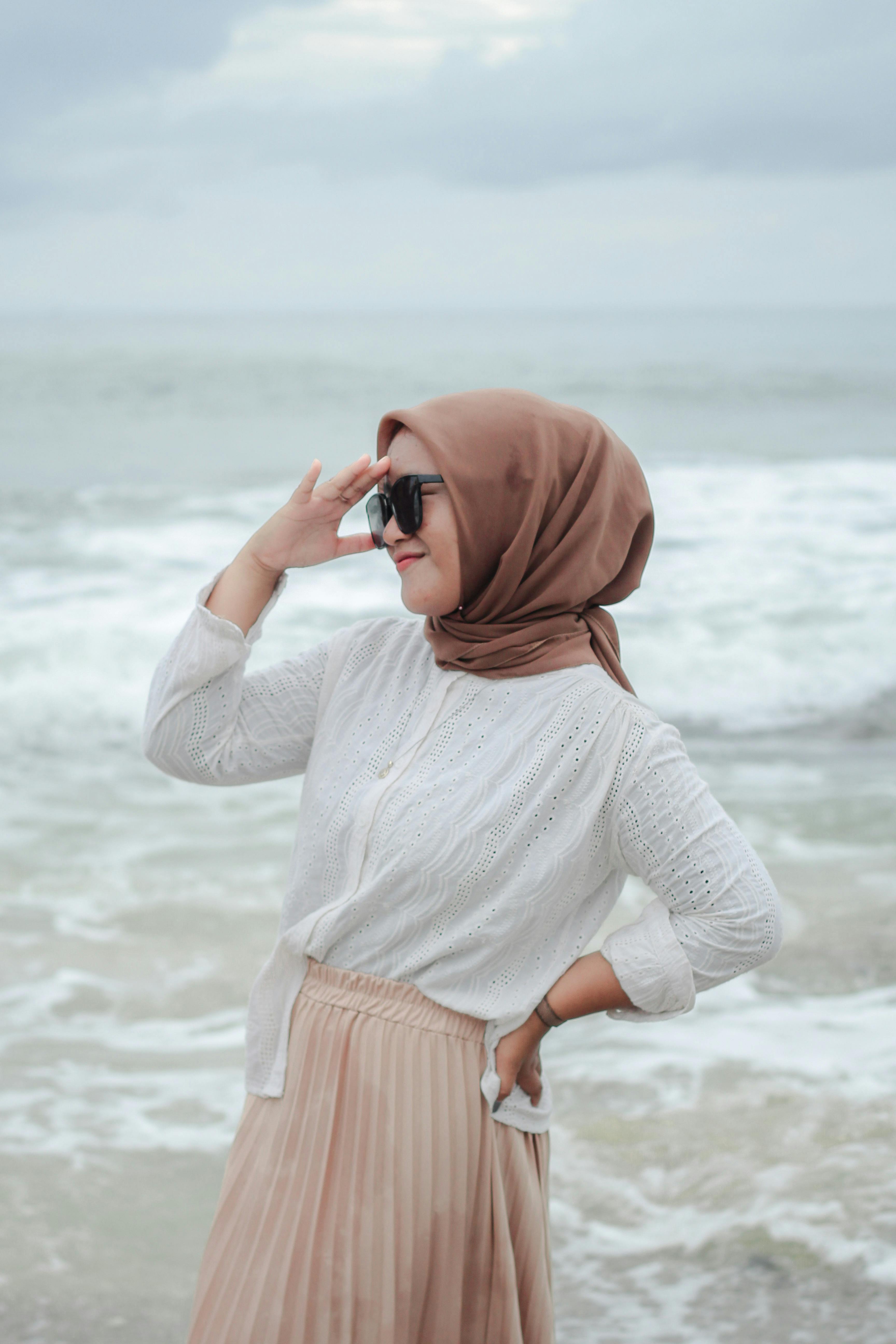 Woman in Hijab Posing in Convertible Car · Free Stock Photo
