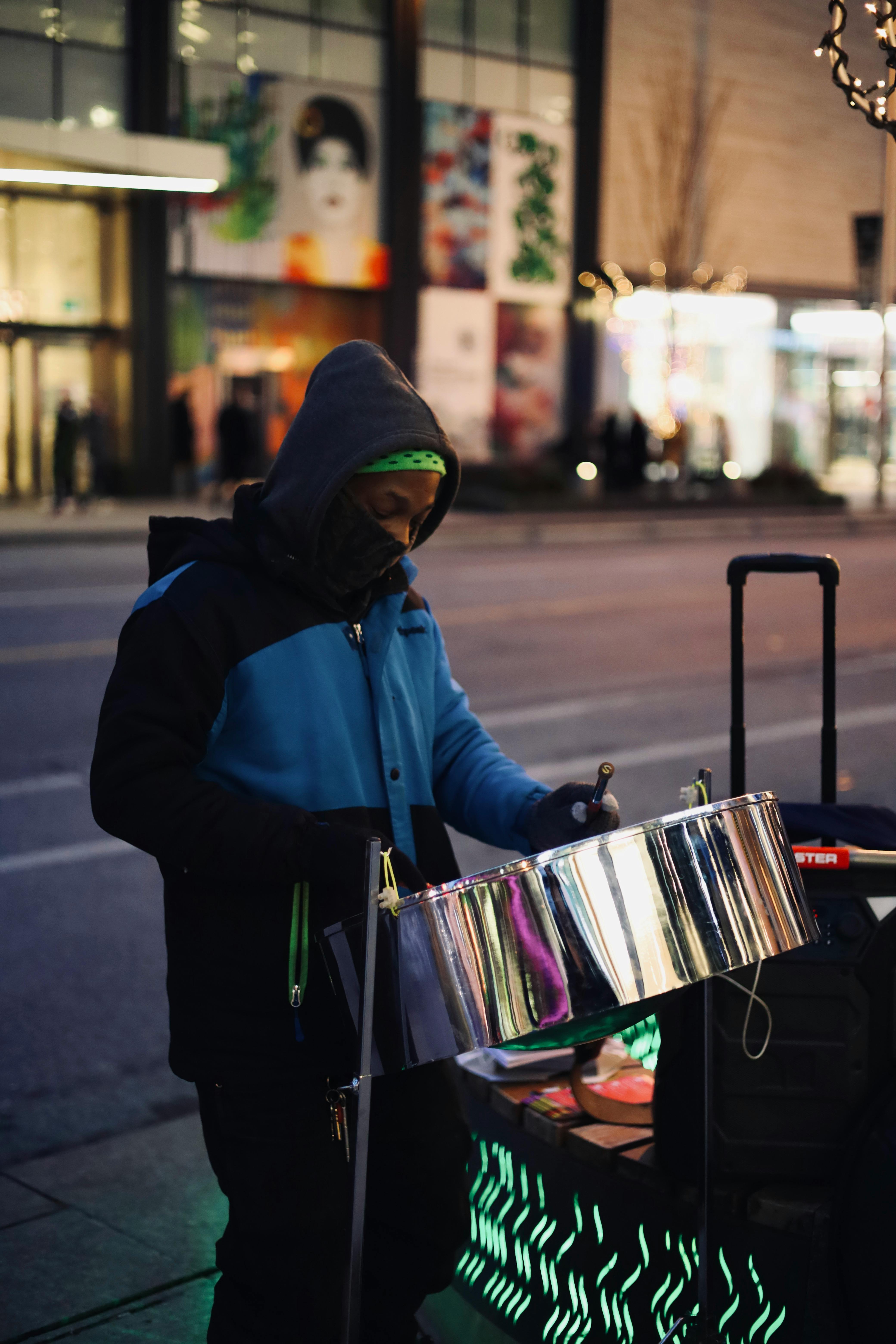 Person Playing Music on the Street · Free Stock Photo