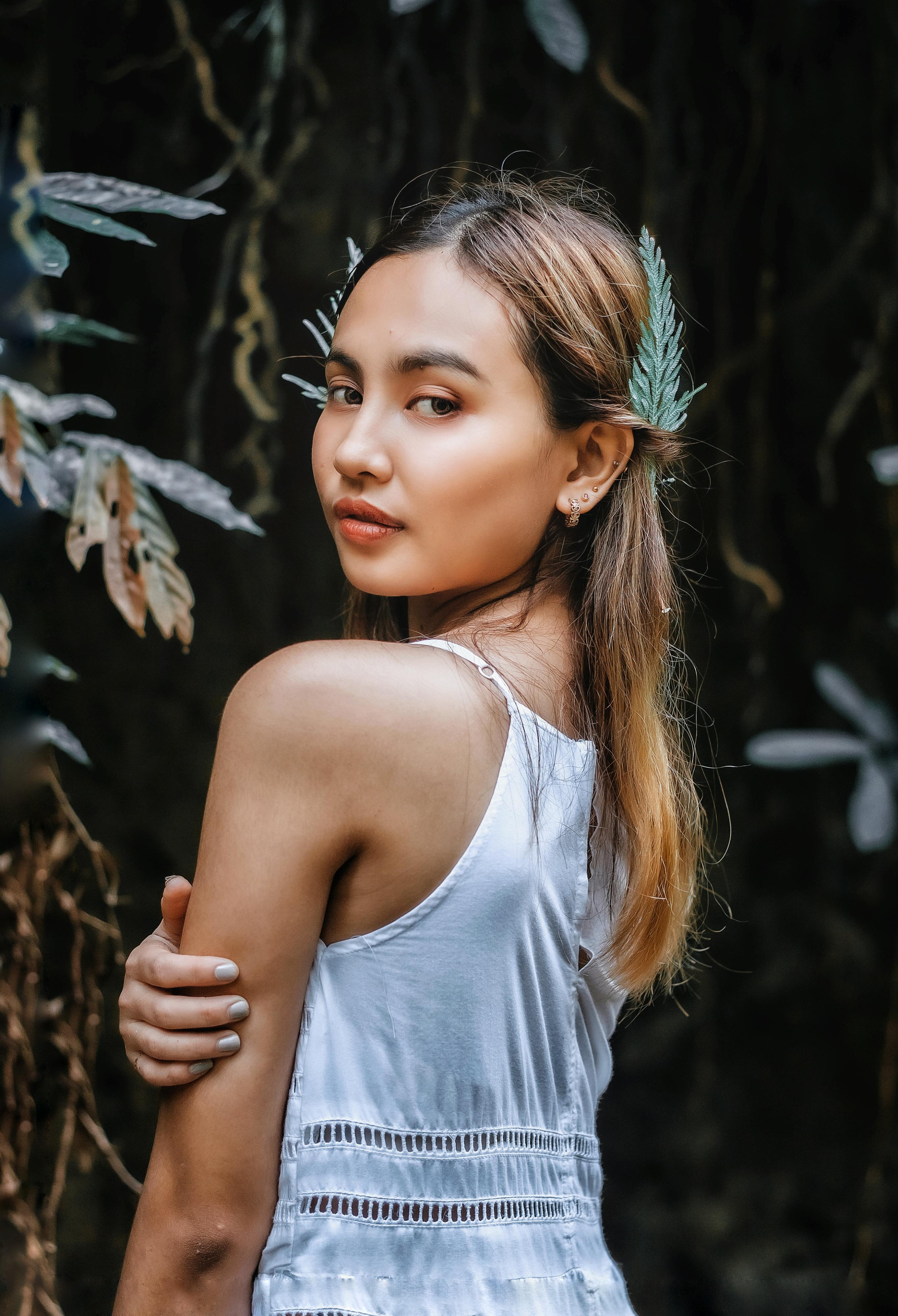 A Woman Looking Over Shoulder · Free Stock Photo