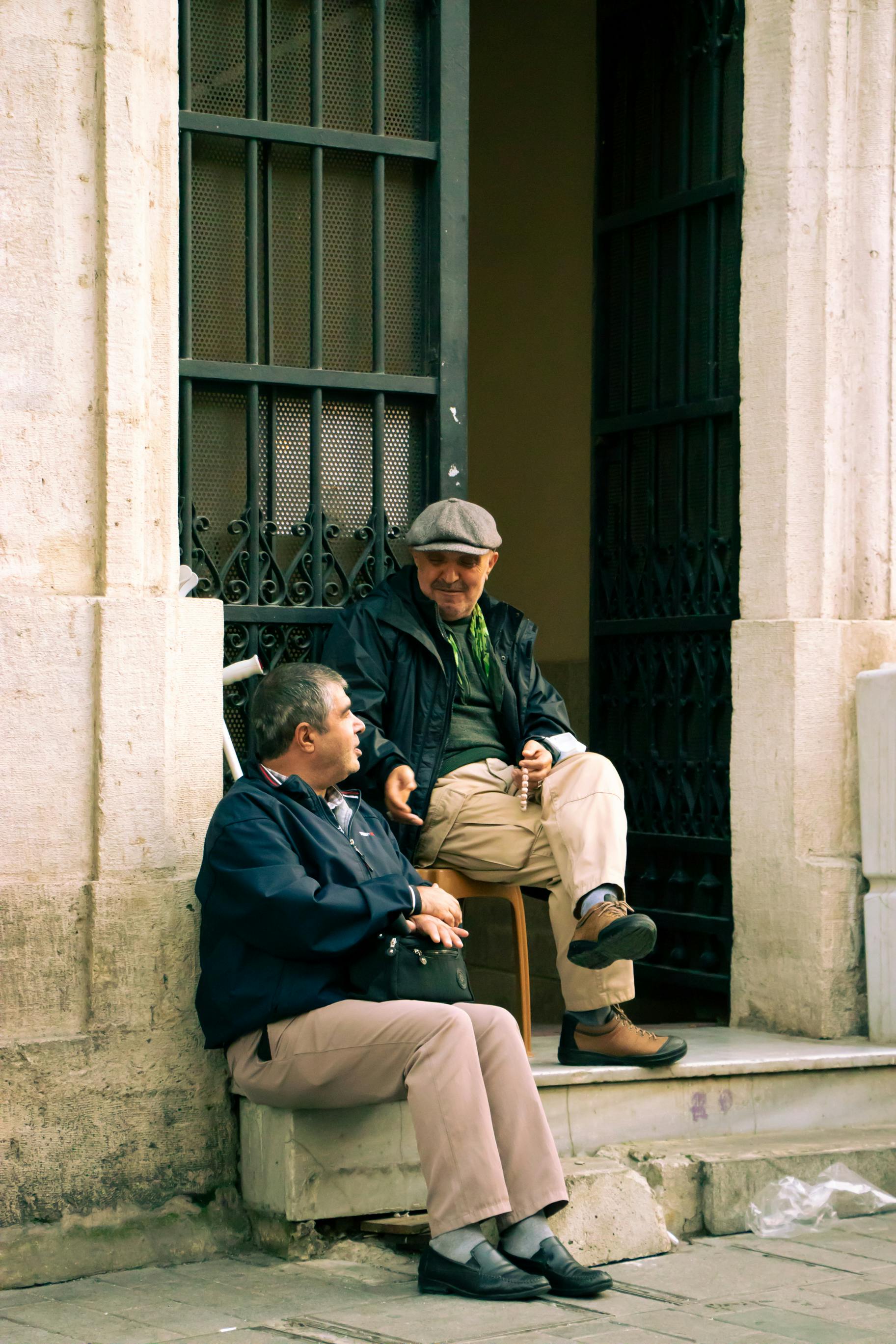 Two Men Talking Together · Free Stock Photo