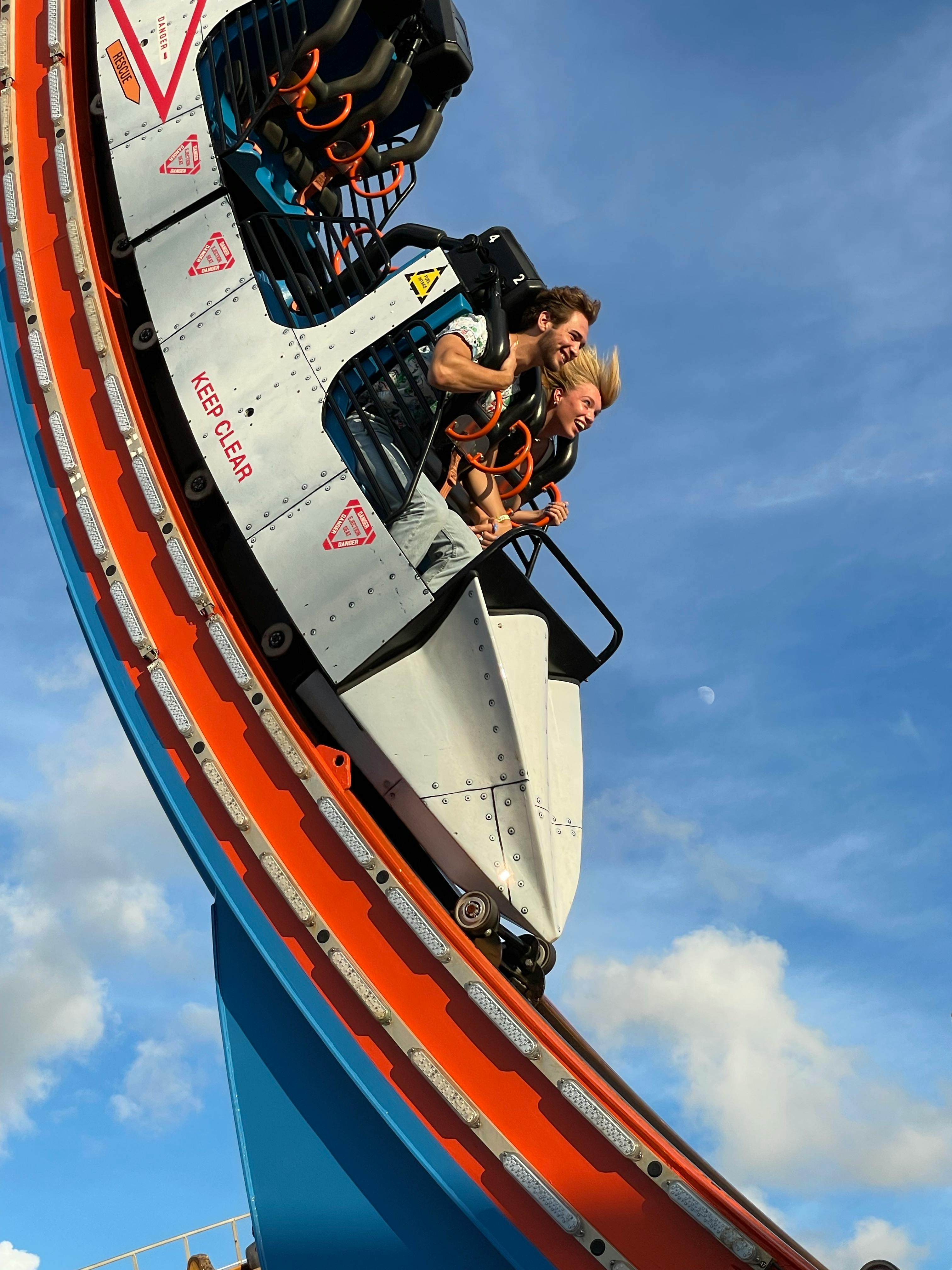 A Couple Riding a Roller Coaster · Free Stock Photo