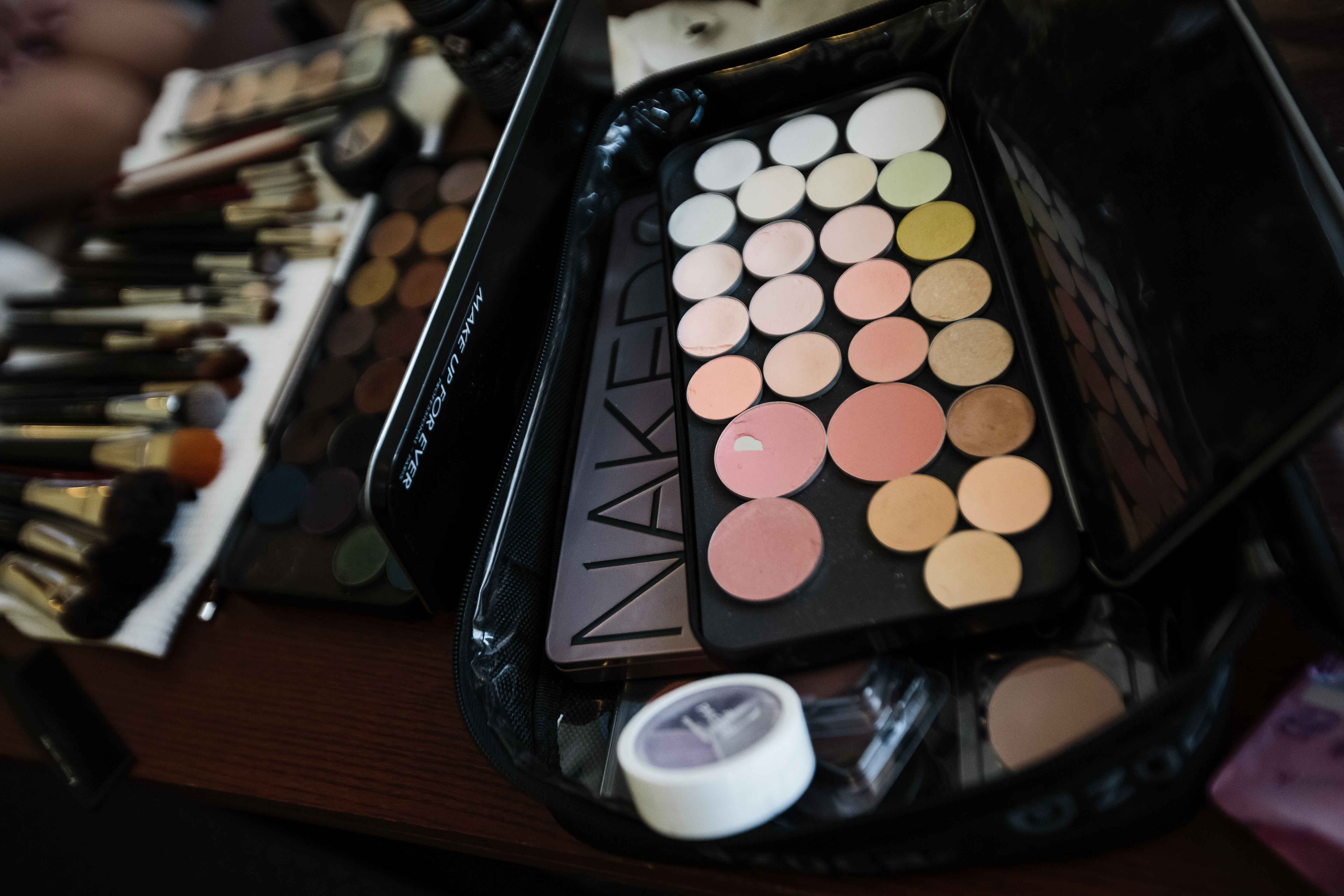 Cosmetics Makeup Brushes and Powder Dust Explosion · Free Stock Photo