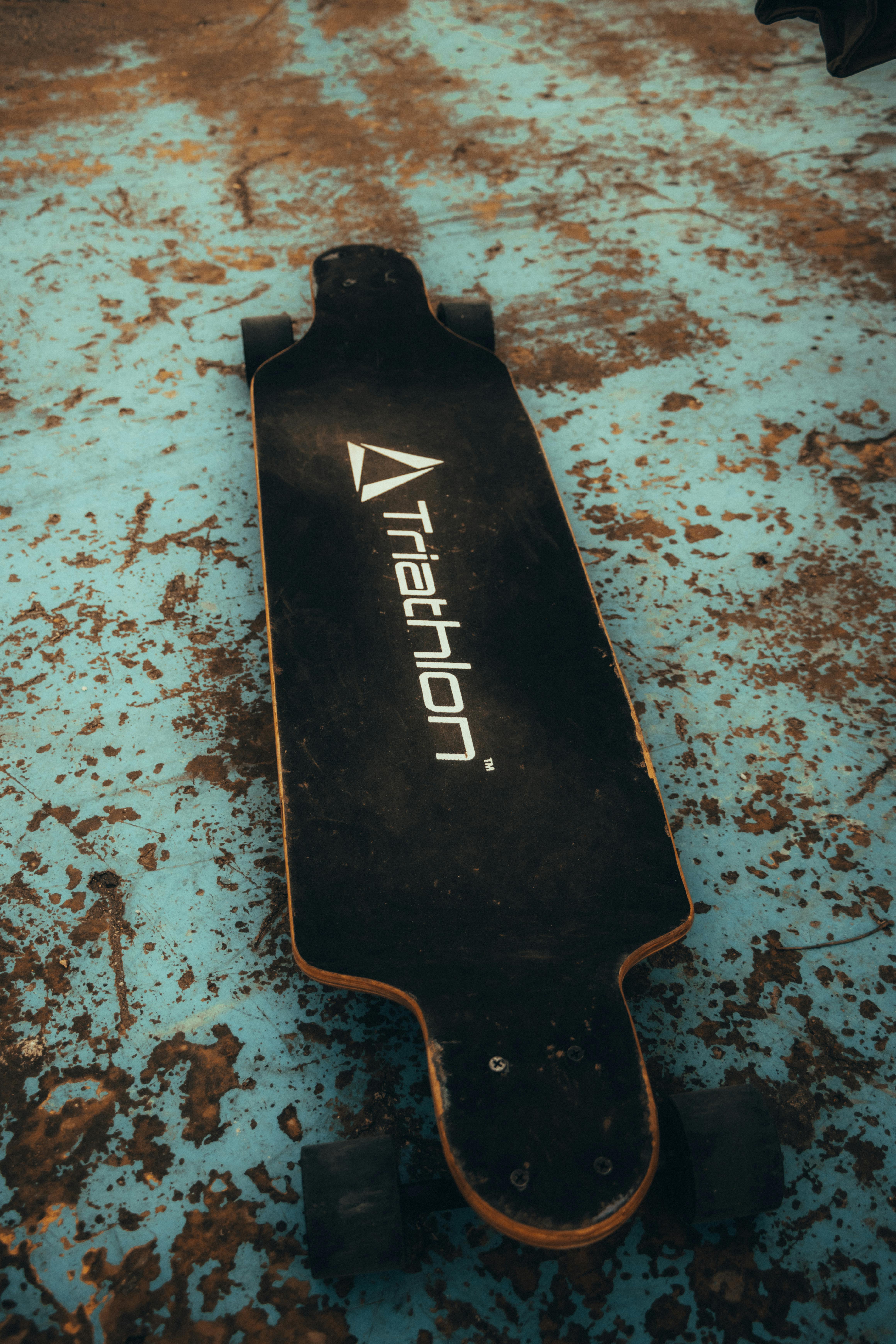 Black Longboard in Close Up Shot · Free Stock Photo