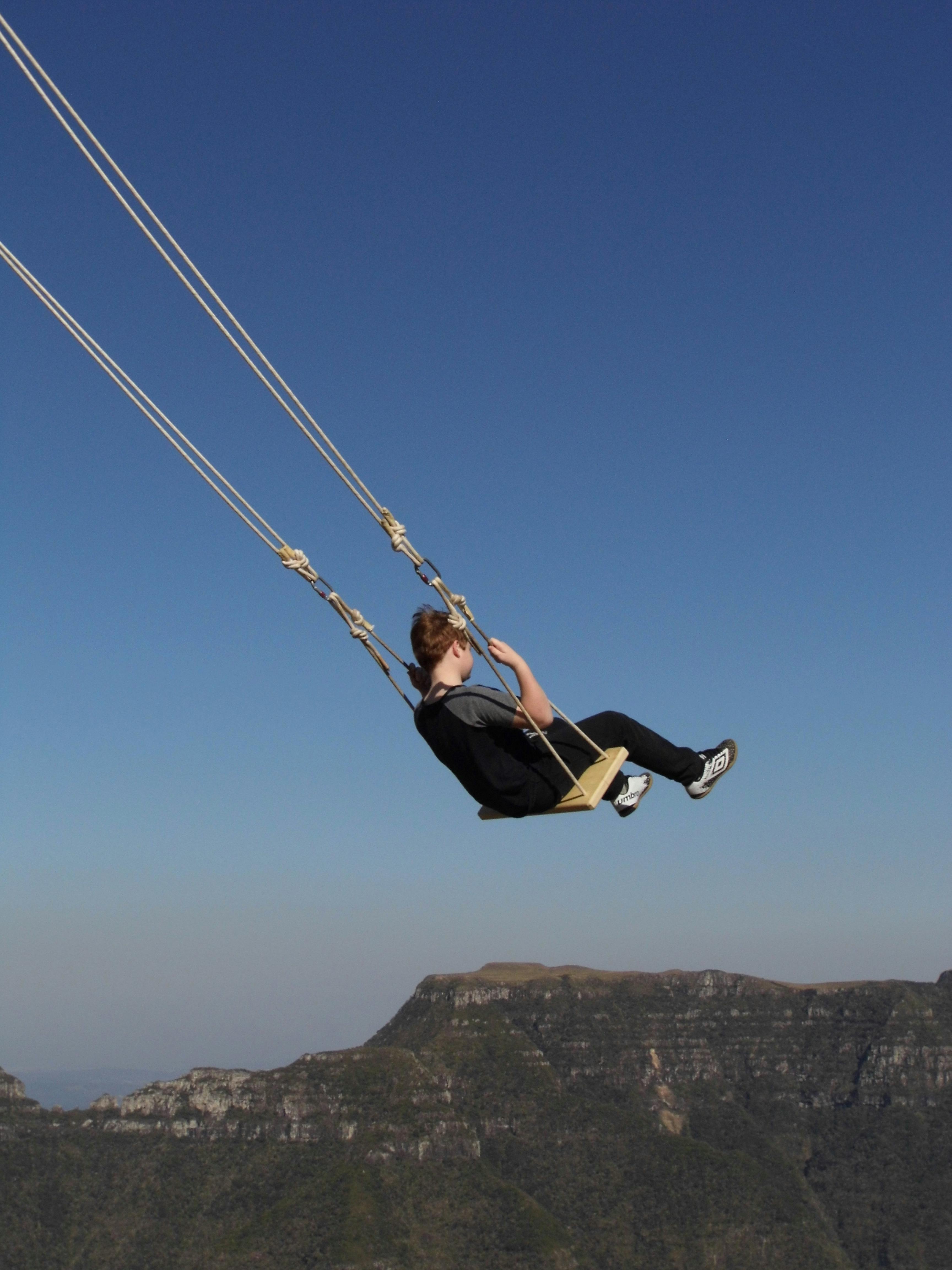 Boy Flying High on the Swing · Free Stock Photo