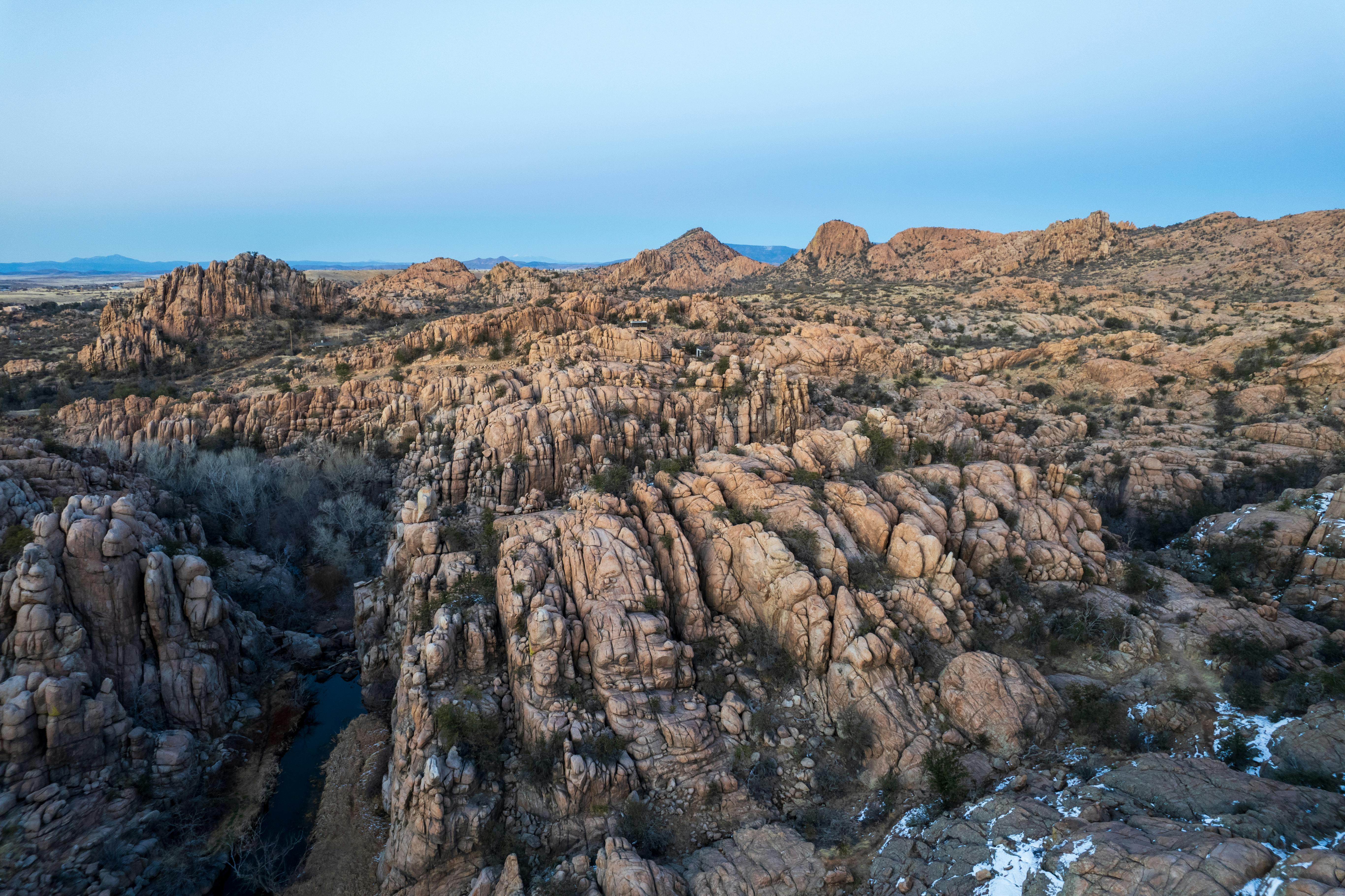 Landscape of Arid Rock Formations · Free Stock Photo