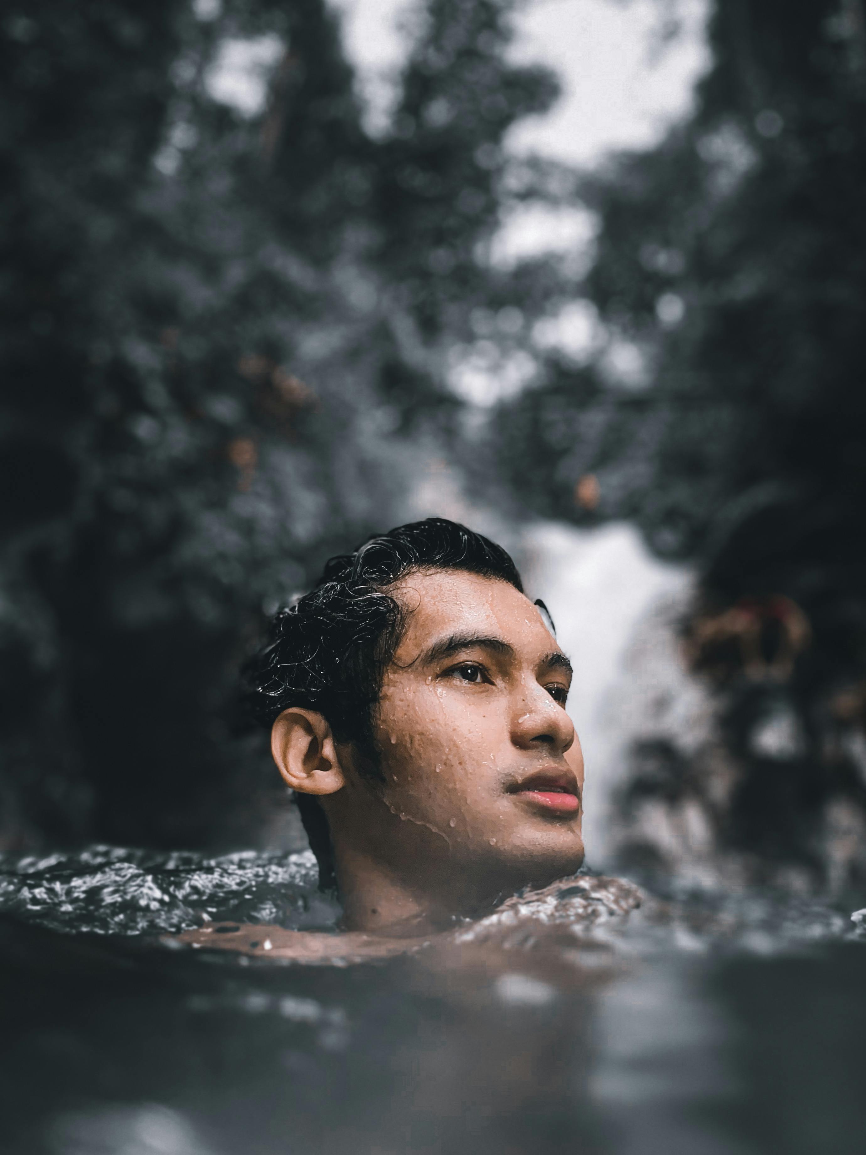 Man in Water in Close Up Photography · Free Stock Photo