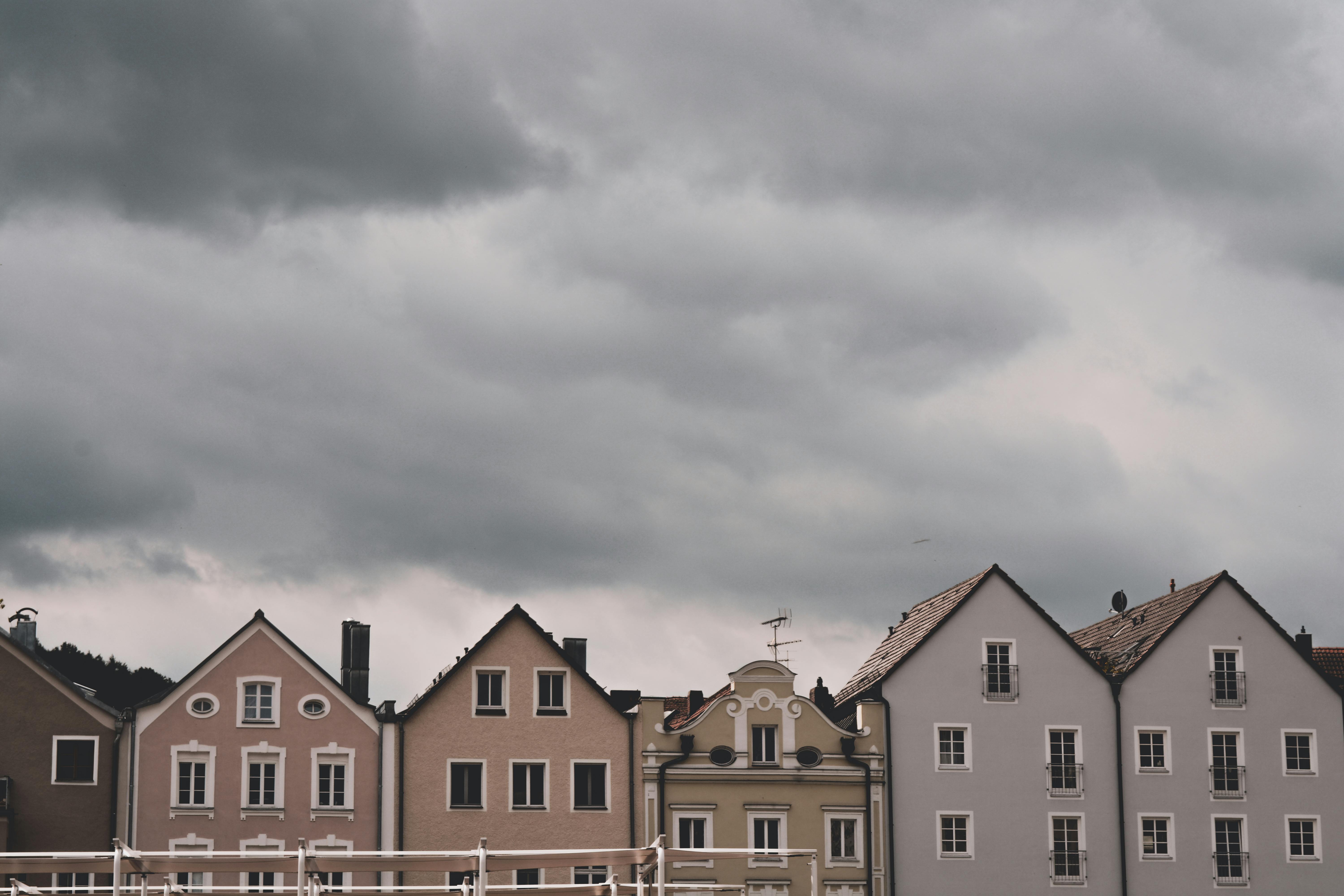 Houses Under Cloudy Sky · Free Stock Photo