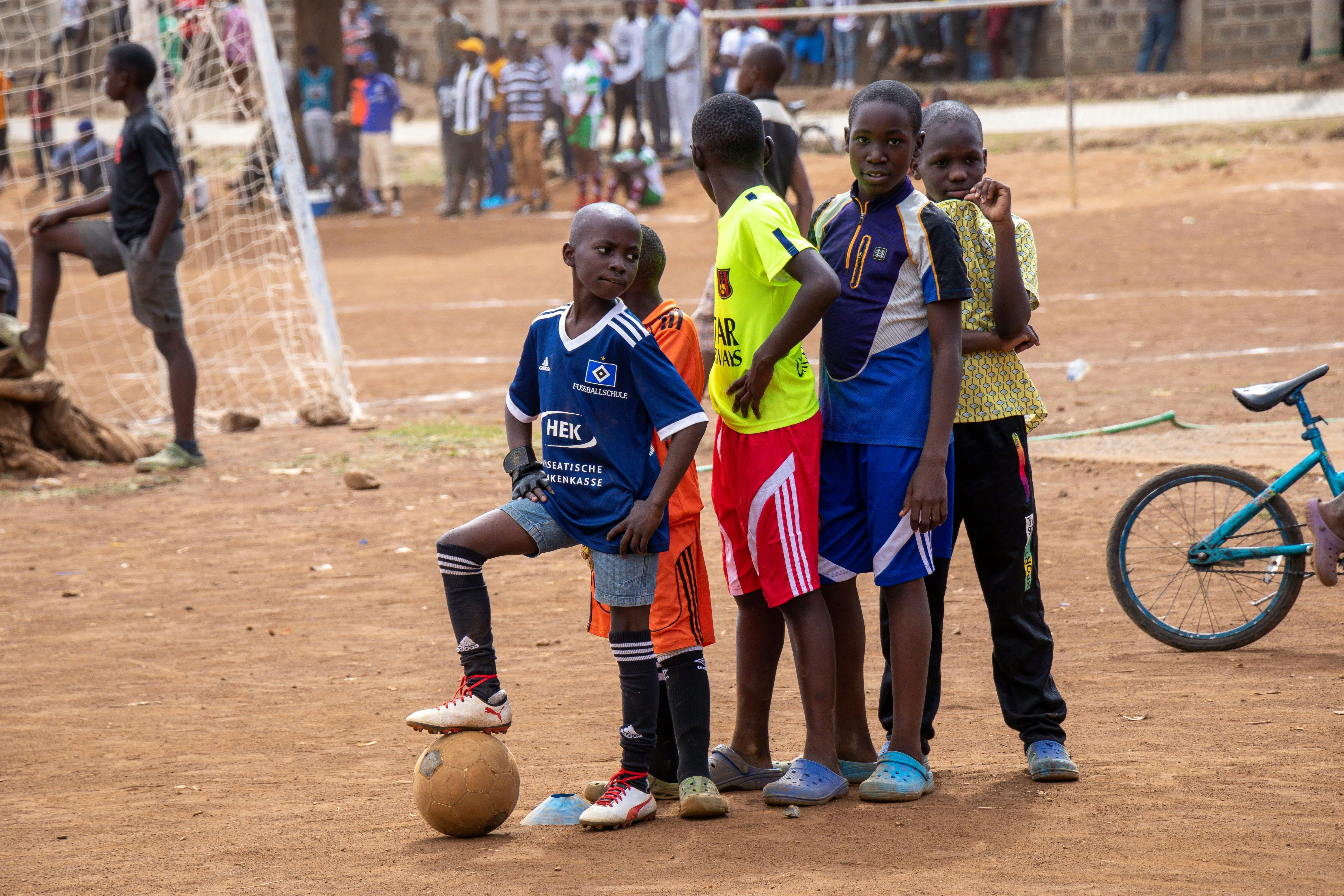 Kids Falling in Line on a Soccer Field · Free Stock Photo