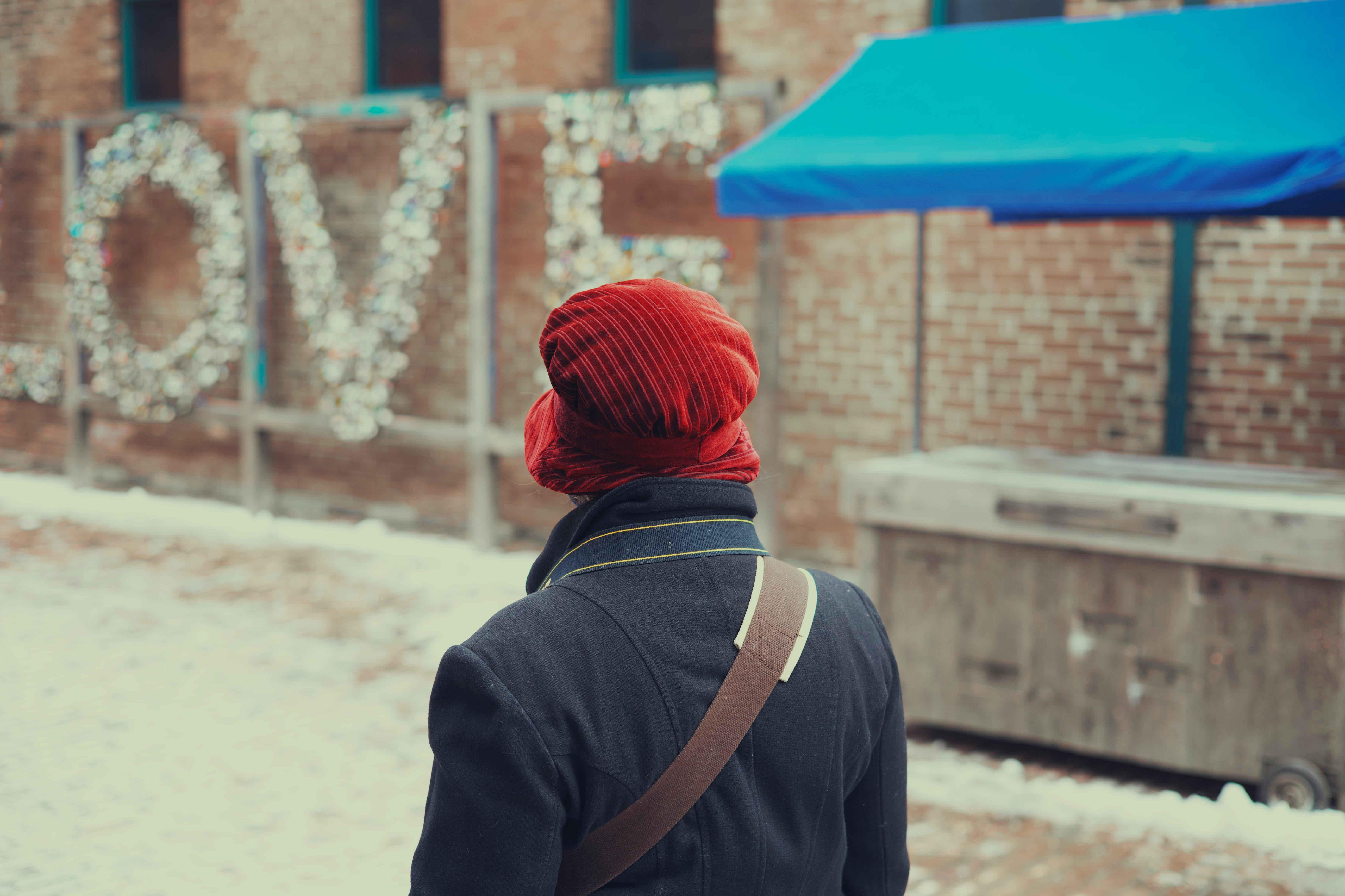 Back View of a Peron in Red Bucket Hat · Free Stock Photo