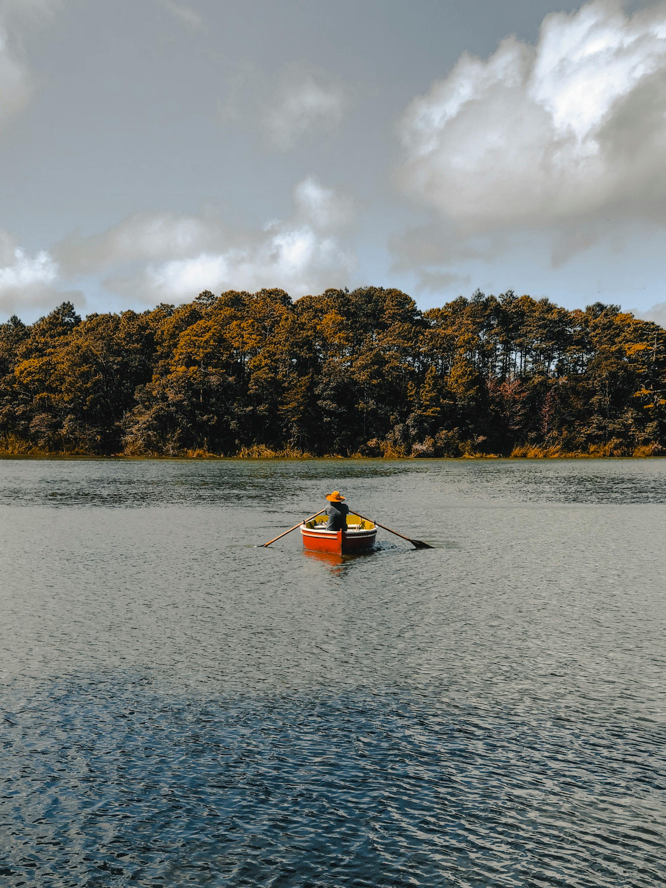 Person Riding on Boat on Lake · Free Stock Photo