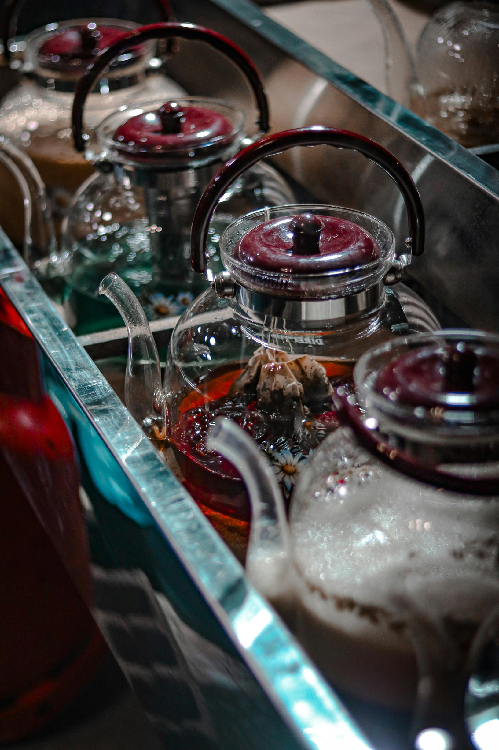 An Assortment of Tea in Teapots · Free Stock Photo