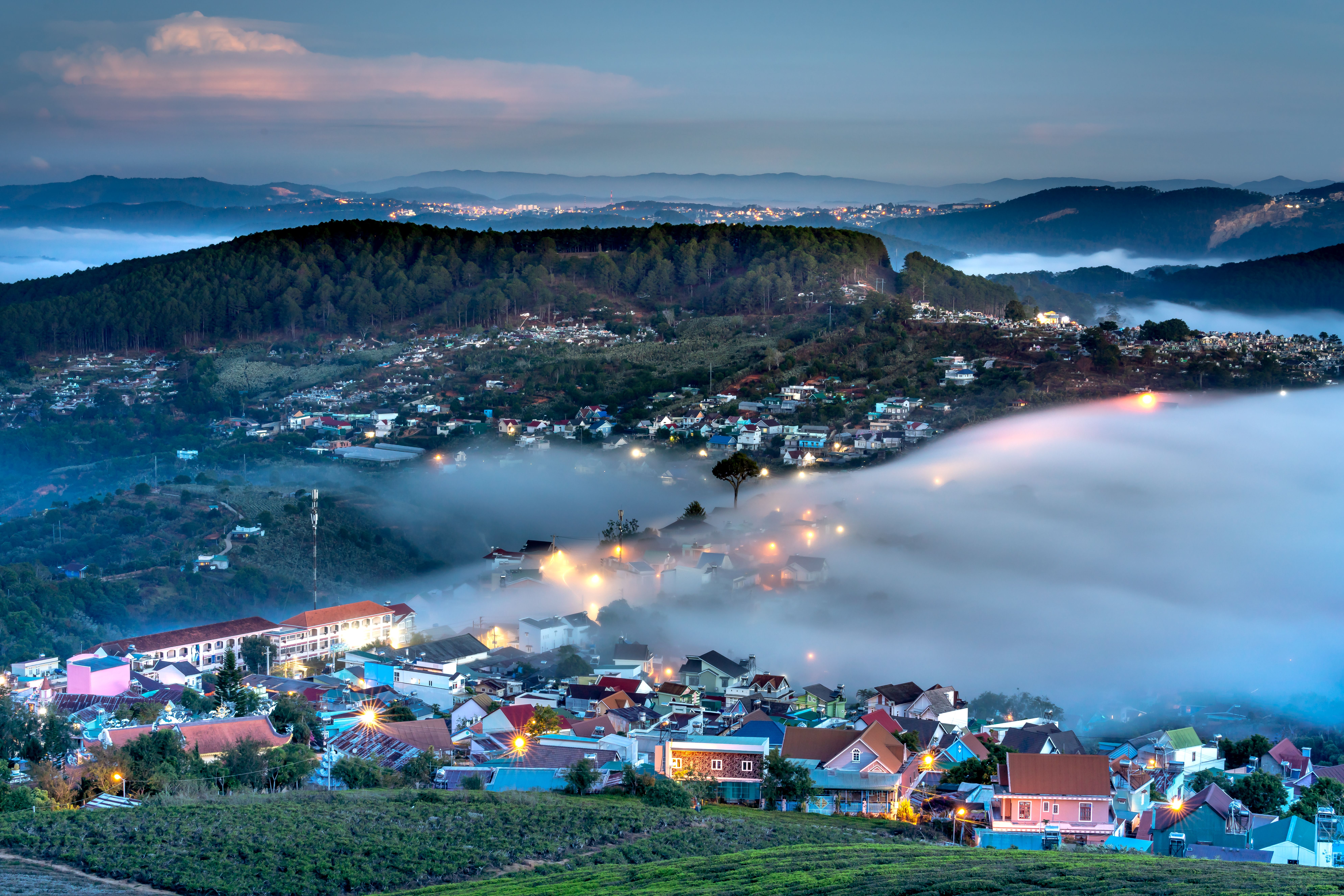 Aerial Footage of a Town covered with Fog · Free Stock Photo
