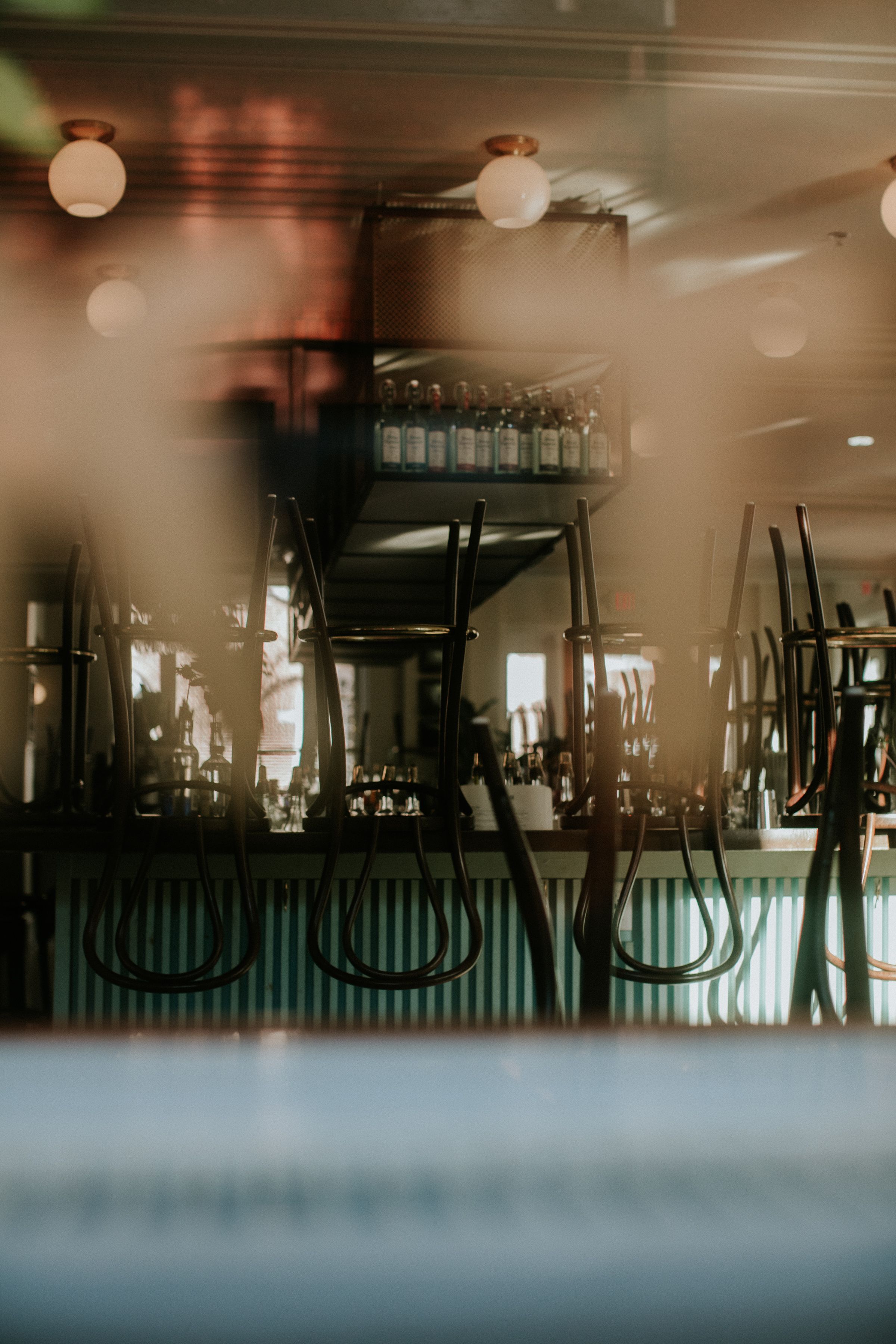 Epe Sitting at Tables in a Cafe Interior · Free Stock Photo