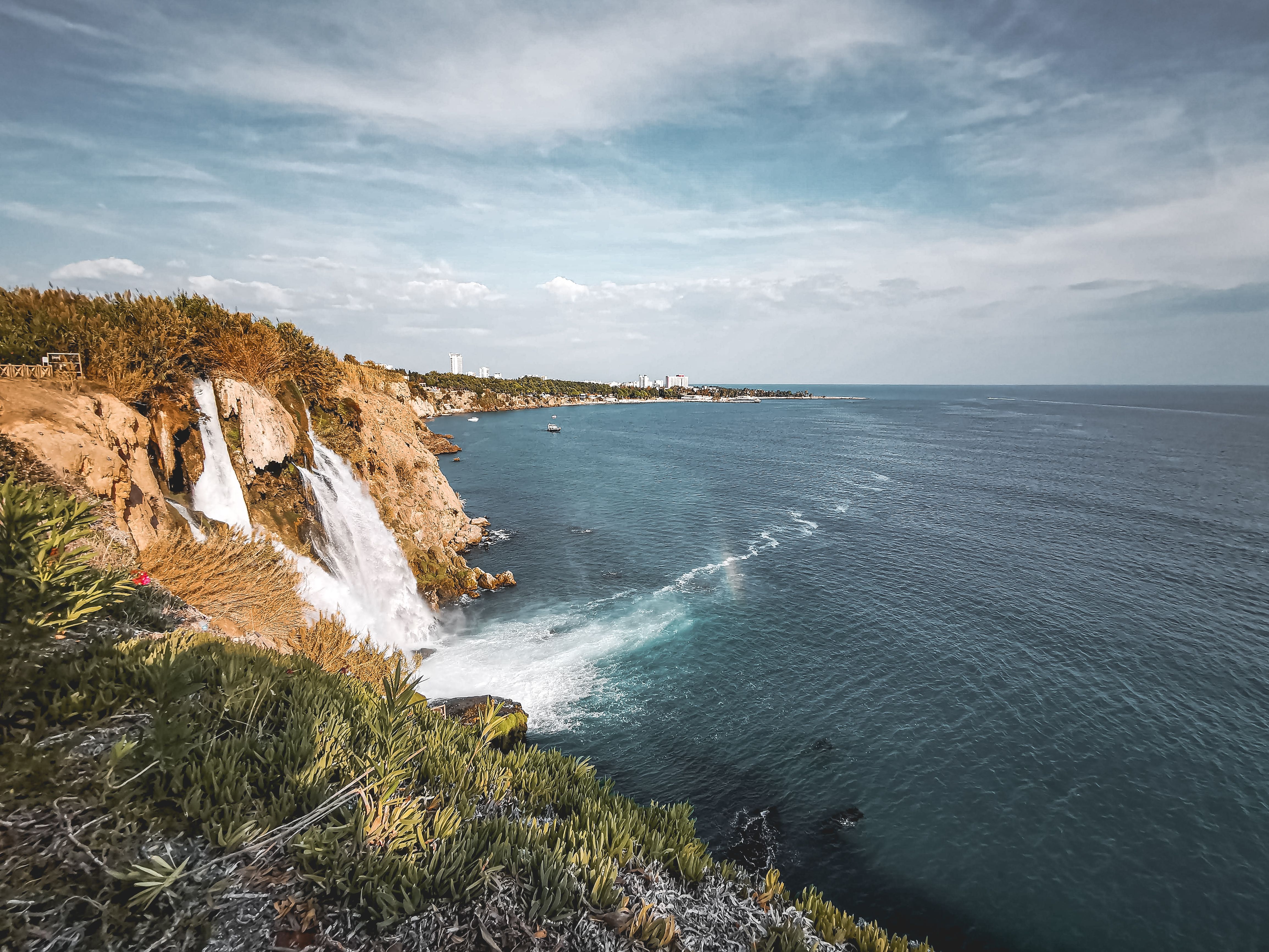 A Waterfall Plunging in the Ocean · Free Stock Photo
