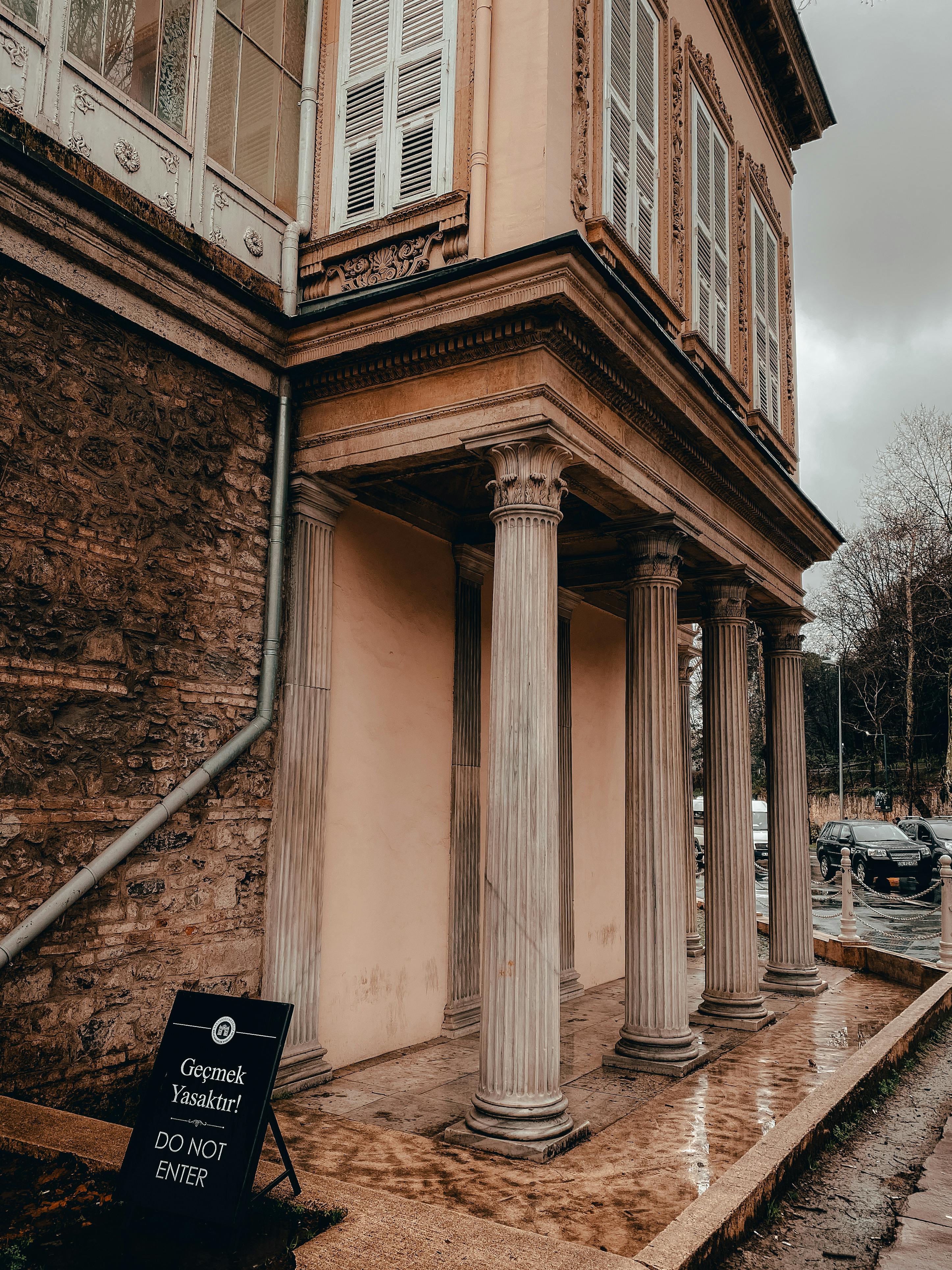 Brown Concrete Building Near Road · Free Stock Photo