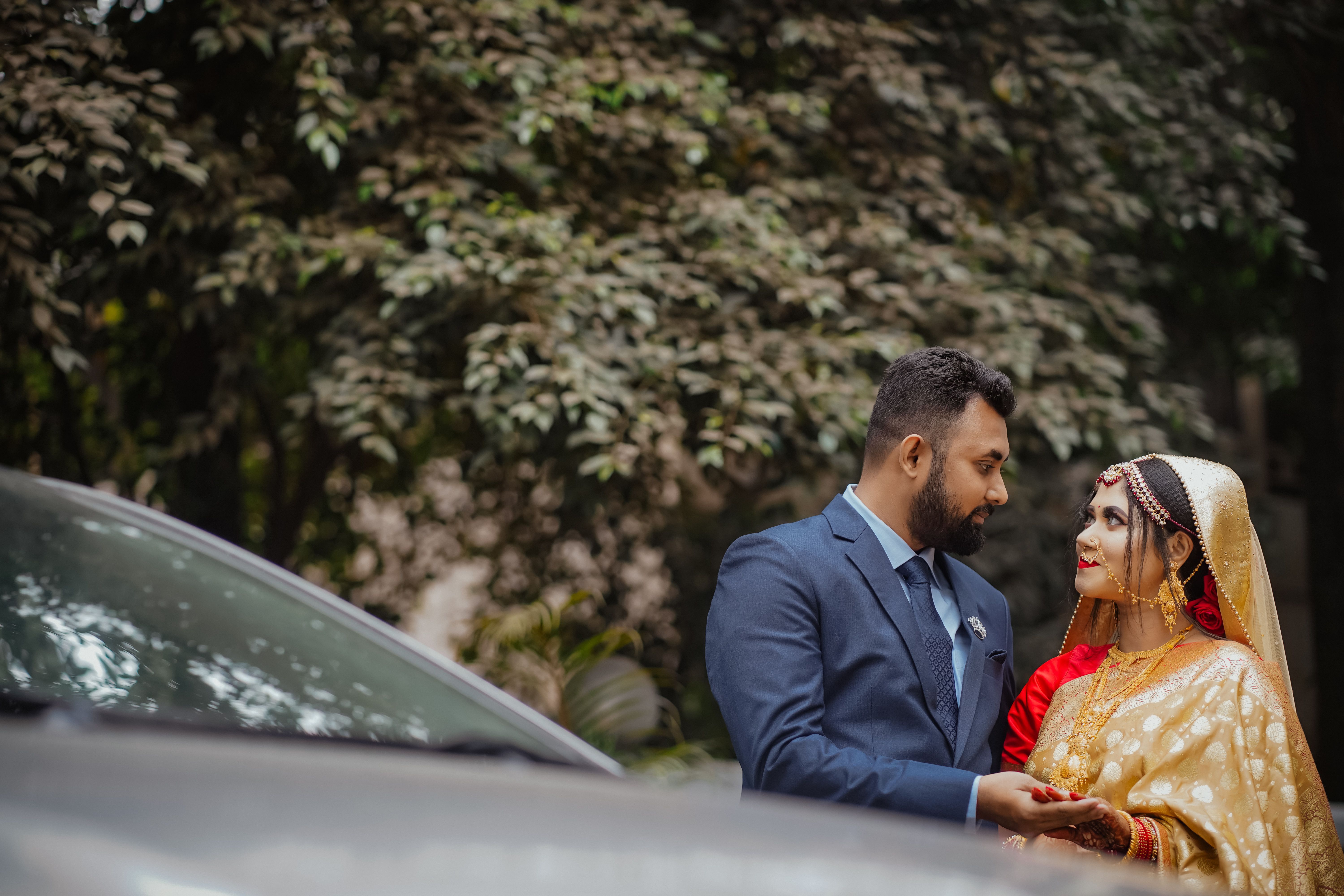 Couple in Traditional Wedding Costumes · Free Stock Photo