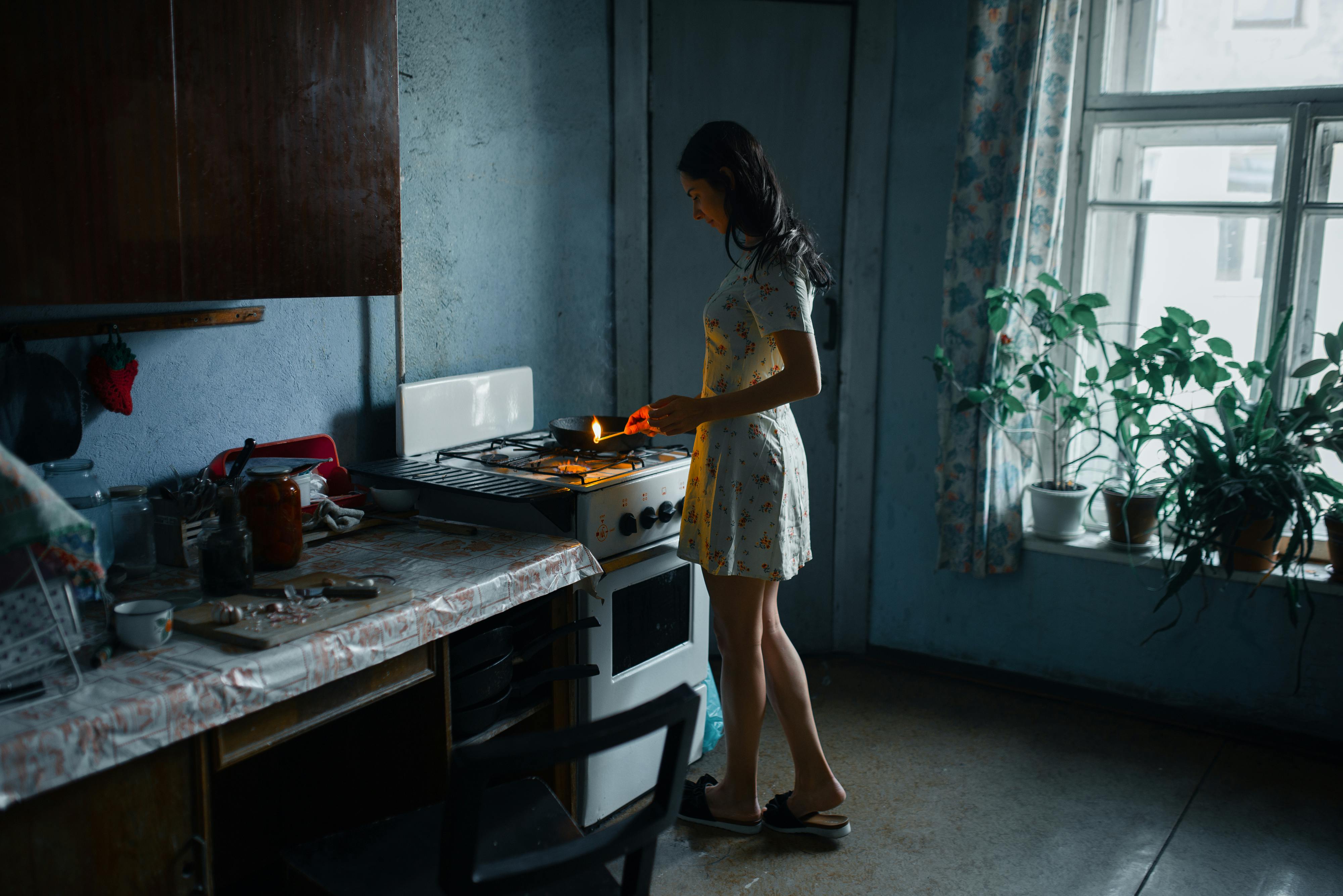 Woman in White Dress Cooking in Kitchen · Free Stock Photo