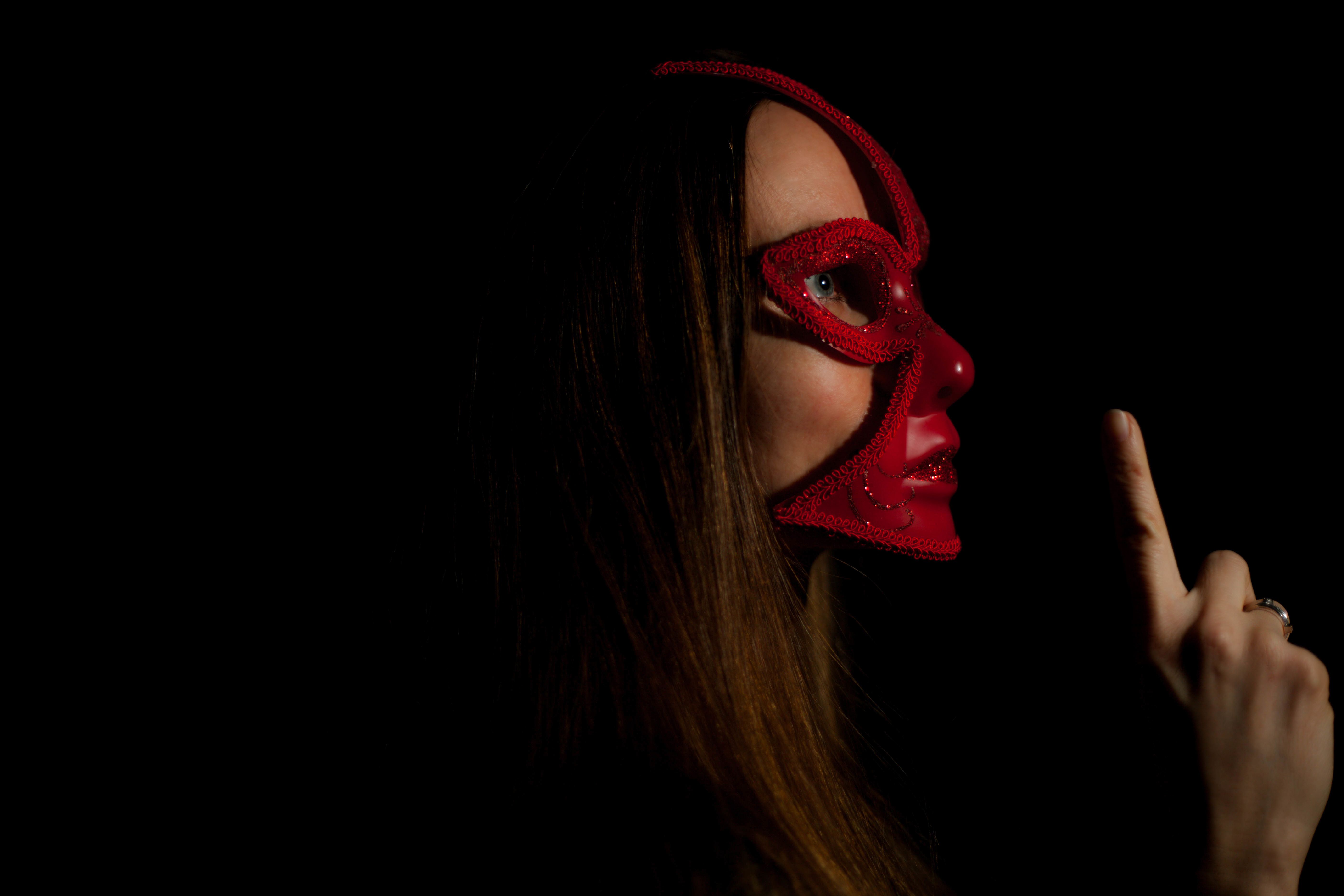 A Woman Wearing Red Mask · Free Stock Photo