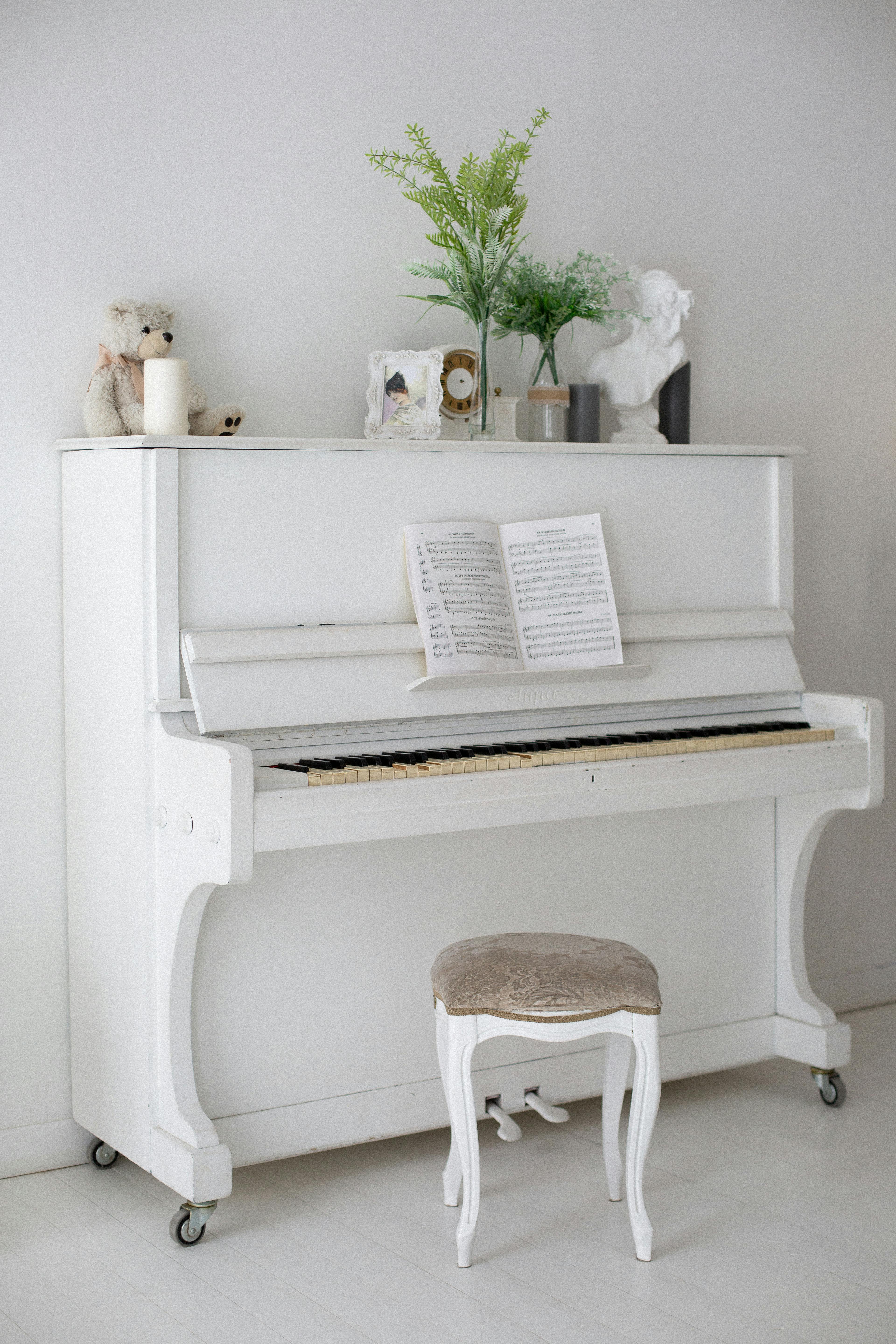 A White Upright Piano · Free Stock Photo