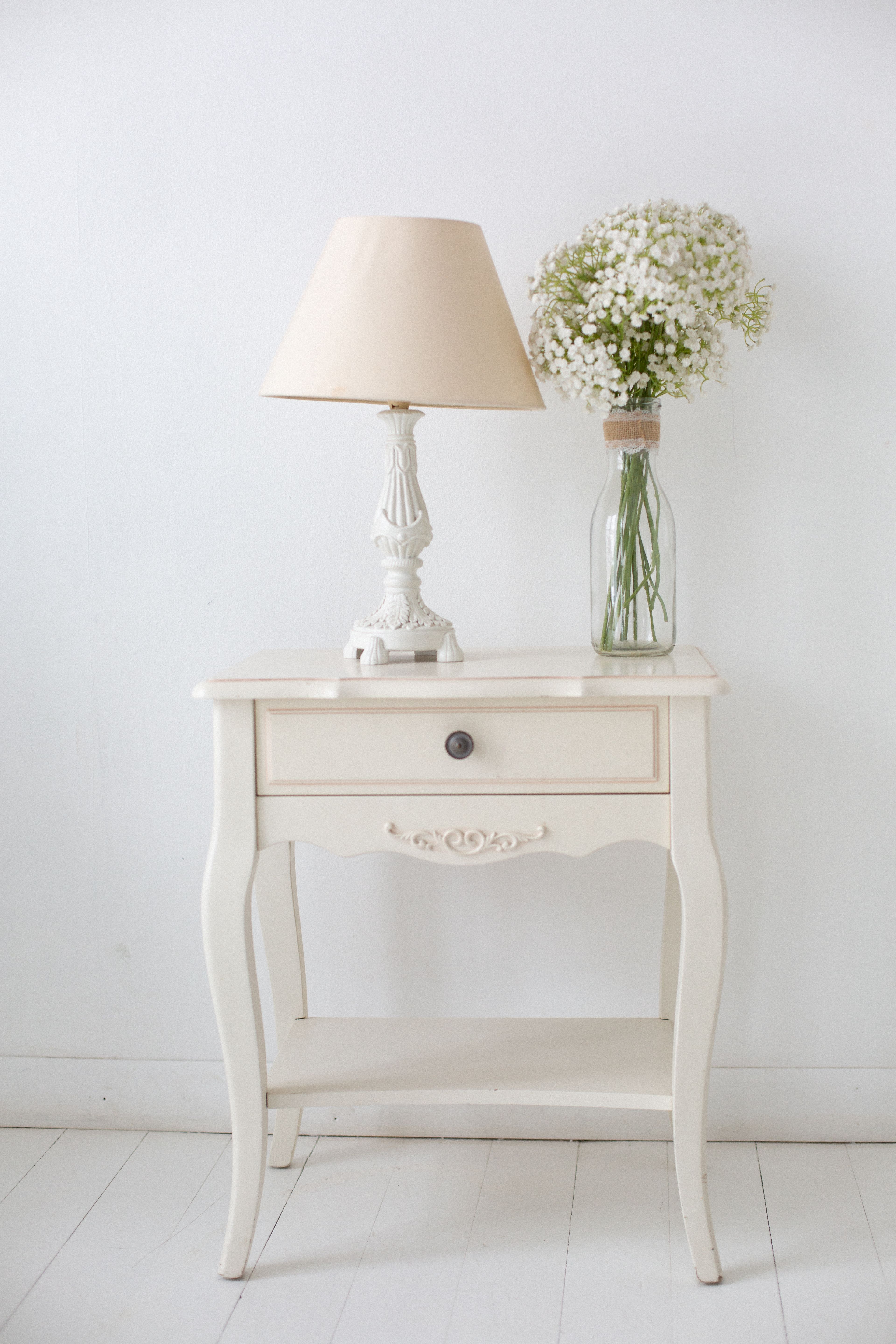 White Table Lamp on White Wooden Side Table · Free Stock Photo