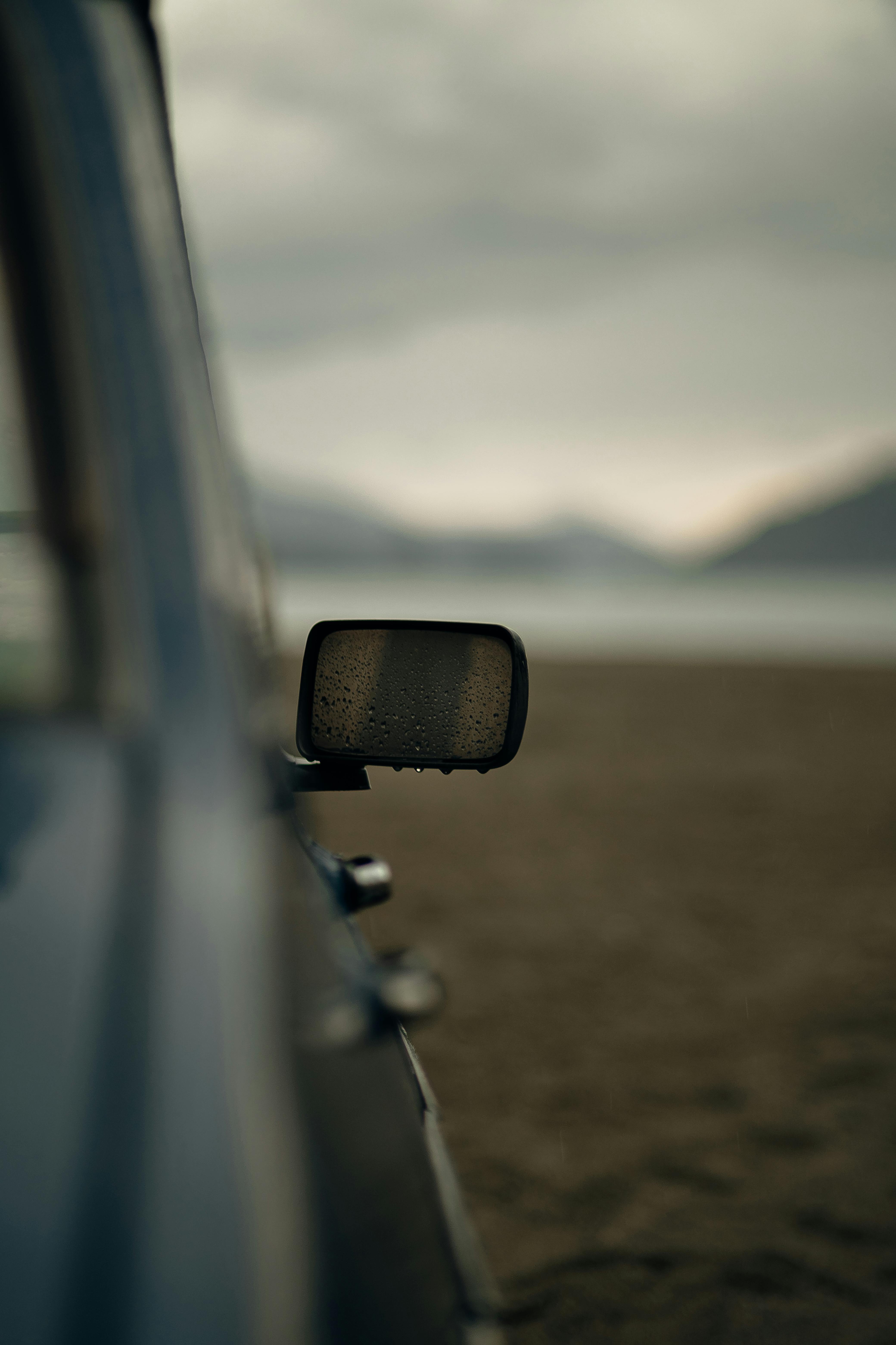 Wet Side Mirror of a Car · Free Stock Photo