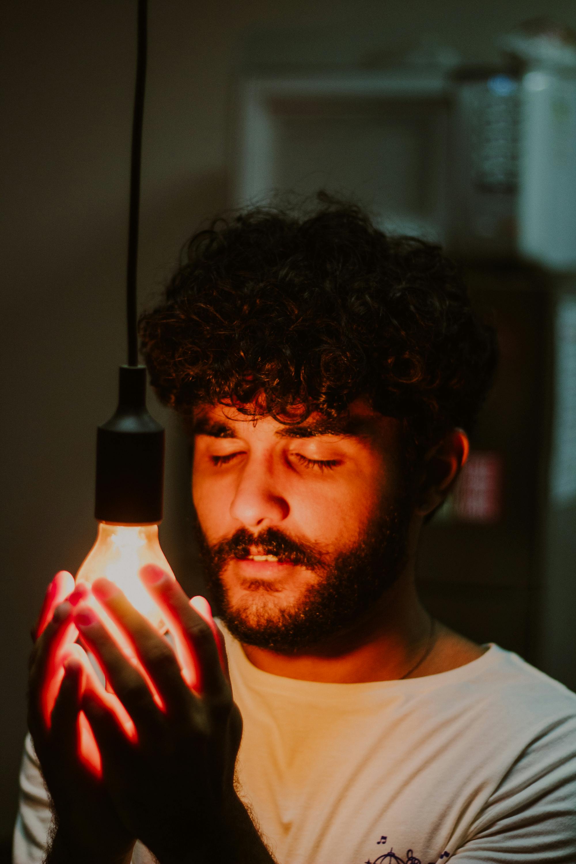 Man with Light Bulb · Free Stock Photo