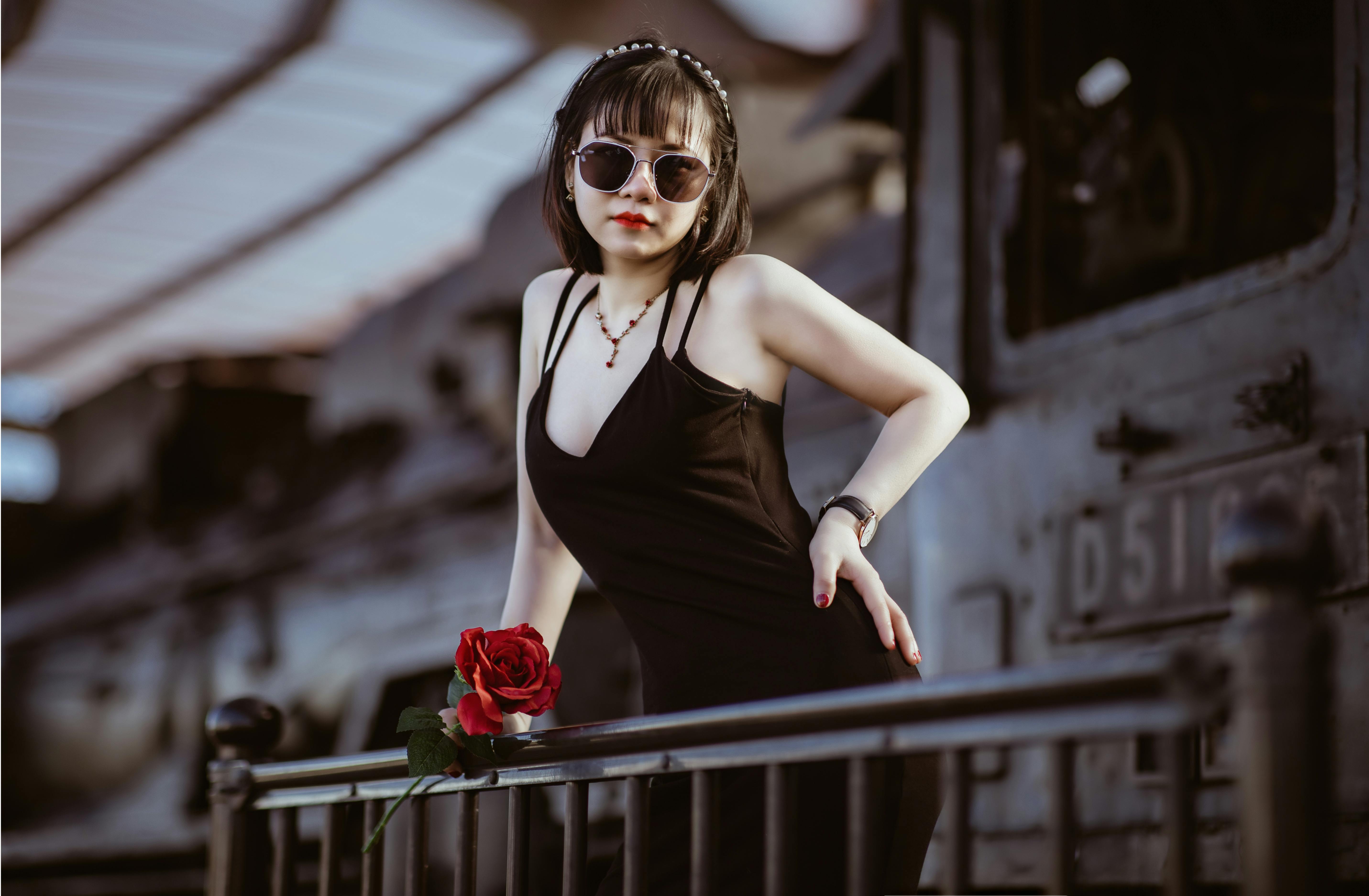 Portrait of a Woman Standing Outdoors · Free Stock Photo