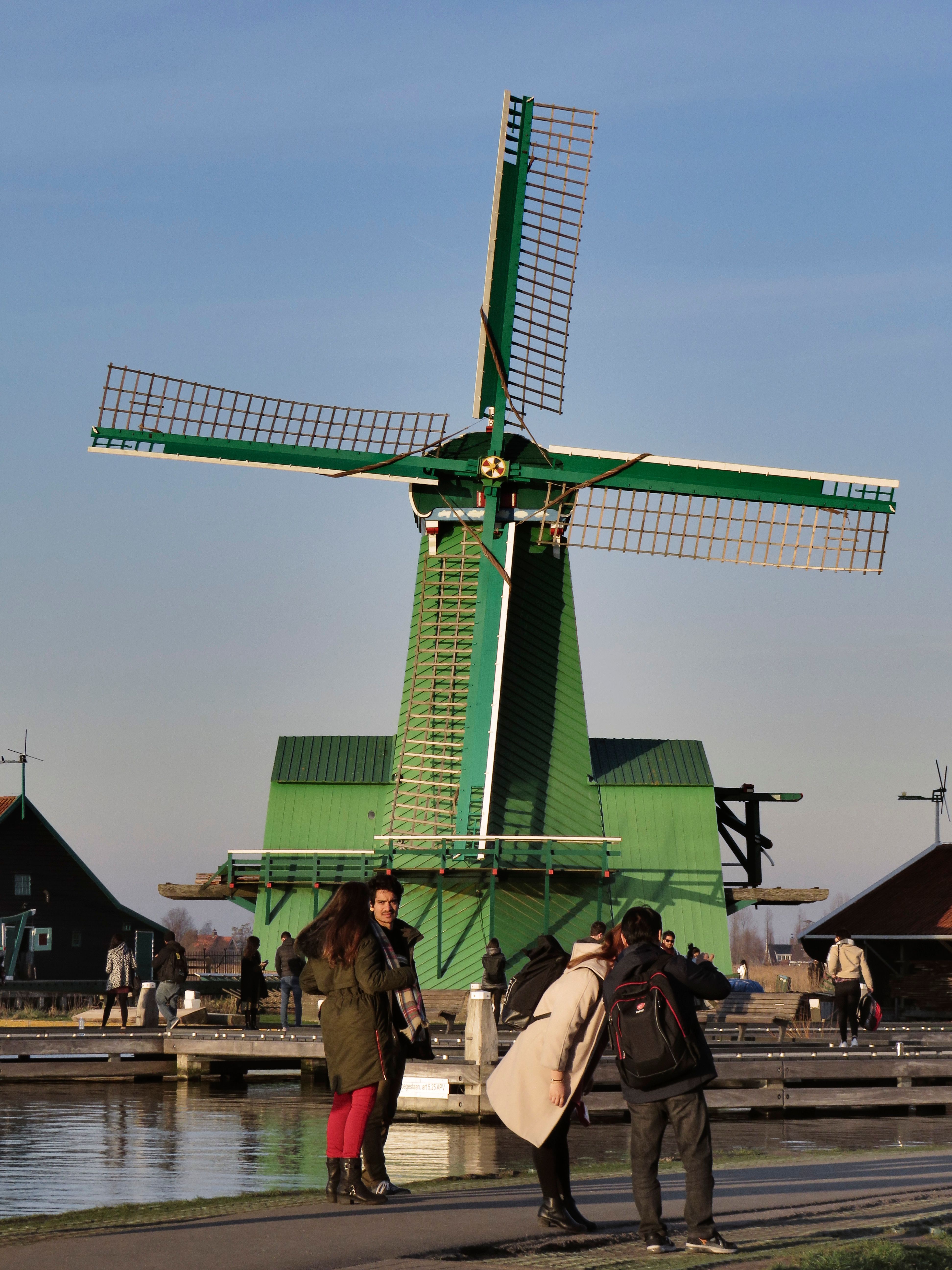 Green Windmill under Clear Sky · Free Stock Photo