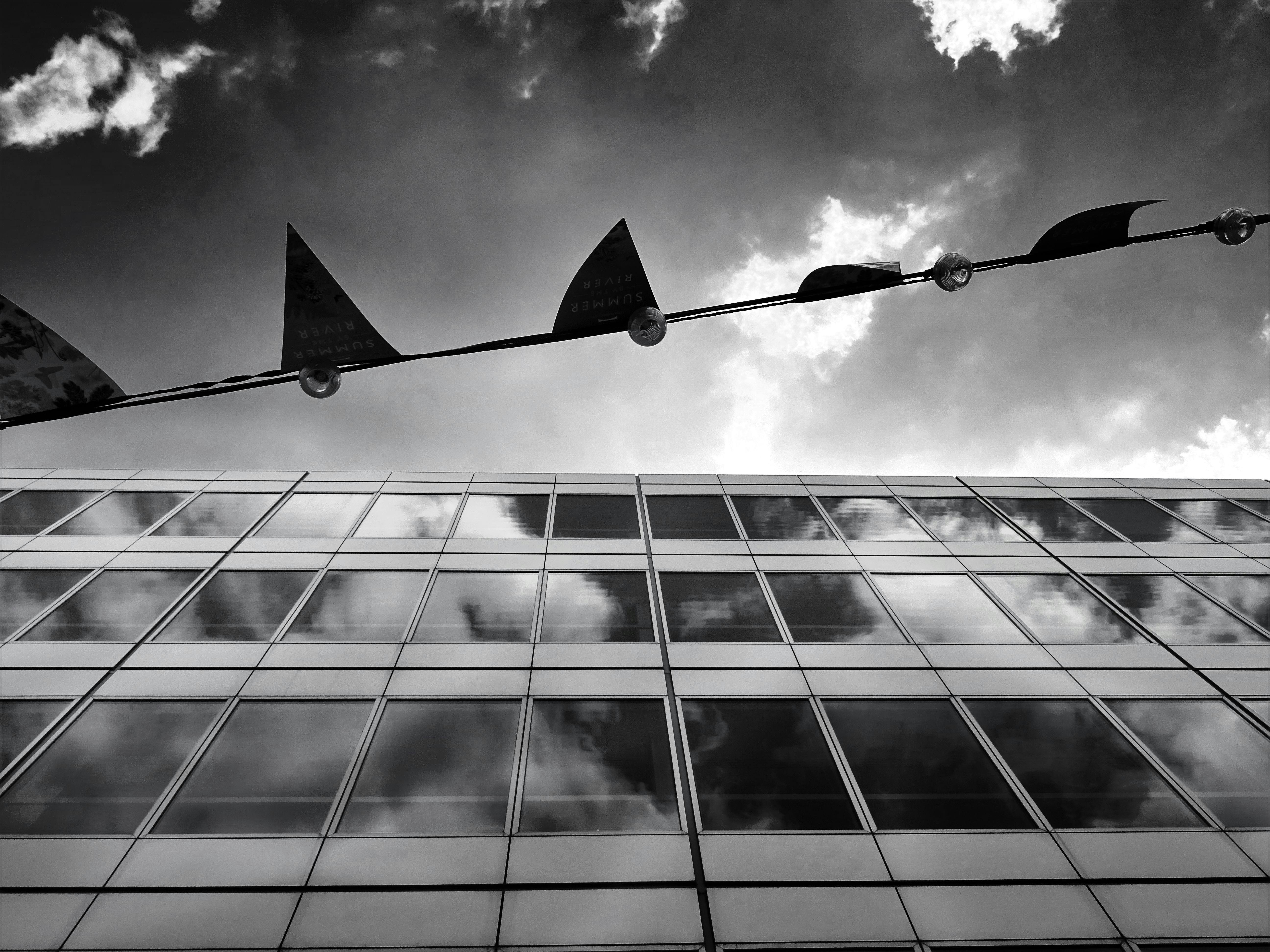 Gray Scale Image of Stone Tower · Free Stock Photo