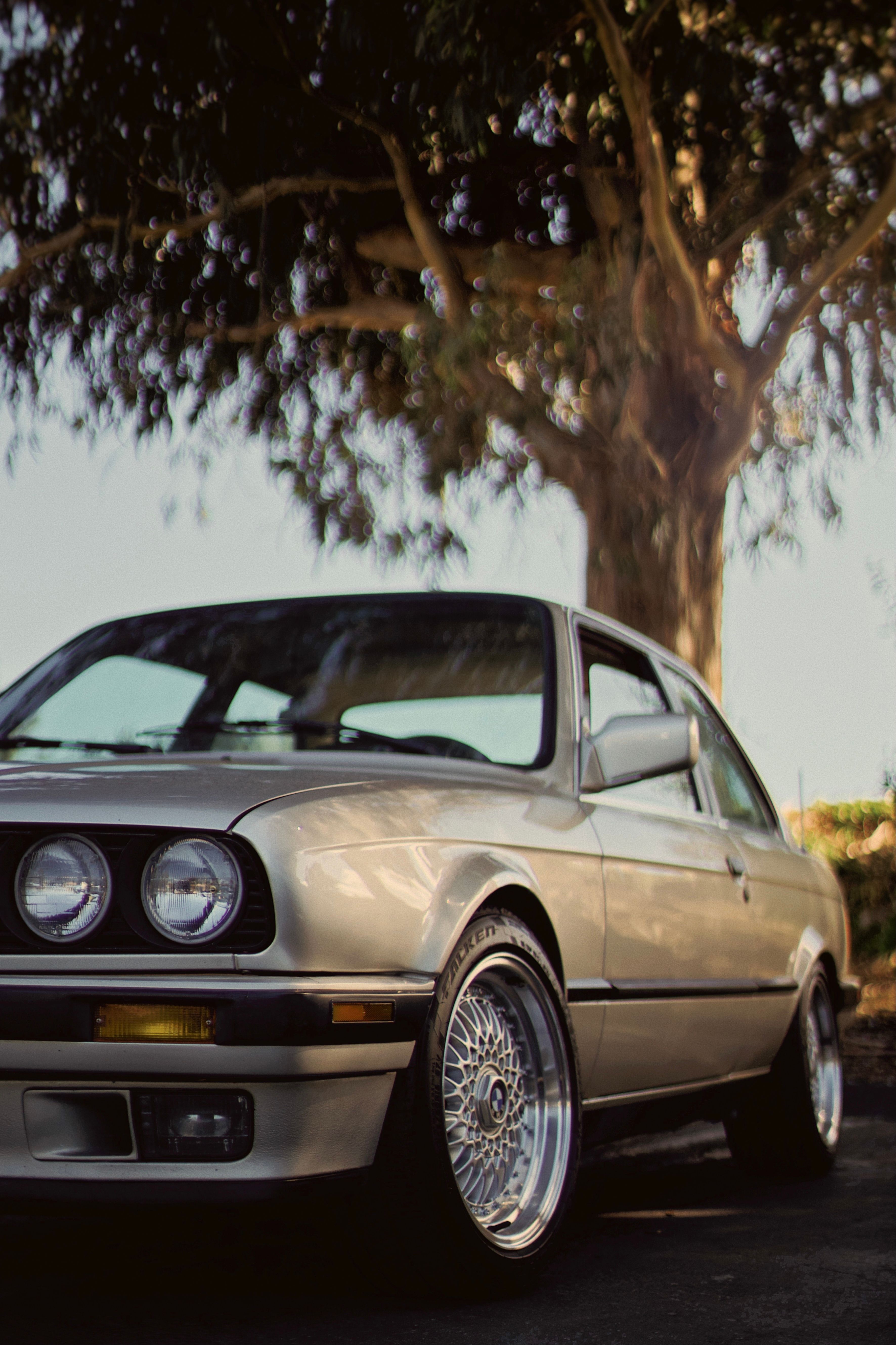 A Silver Car Parked on the Street · Free Stock Photo
