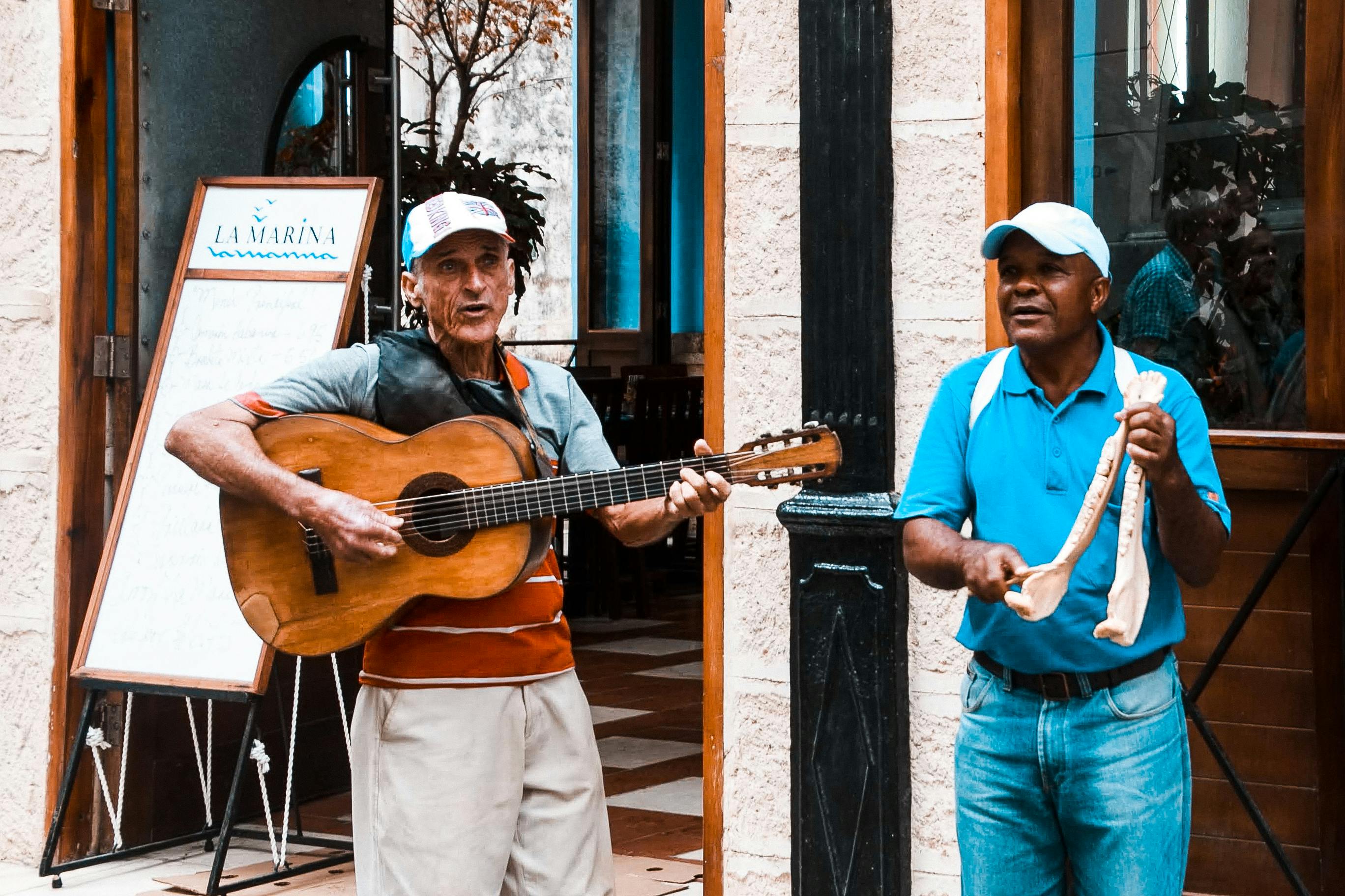 Men Playing Music on the Street · Free Stock Photo