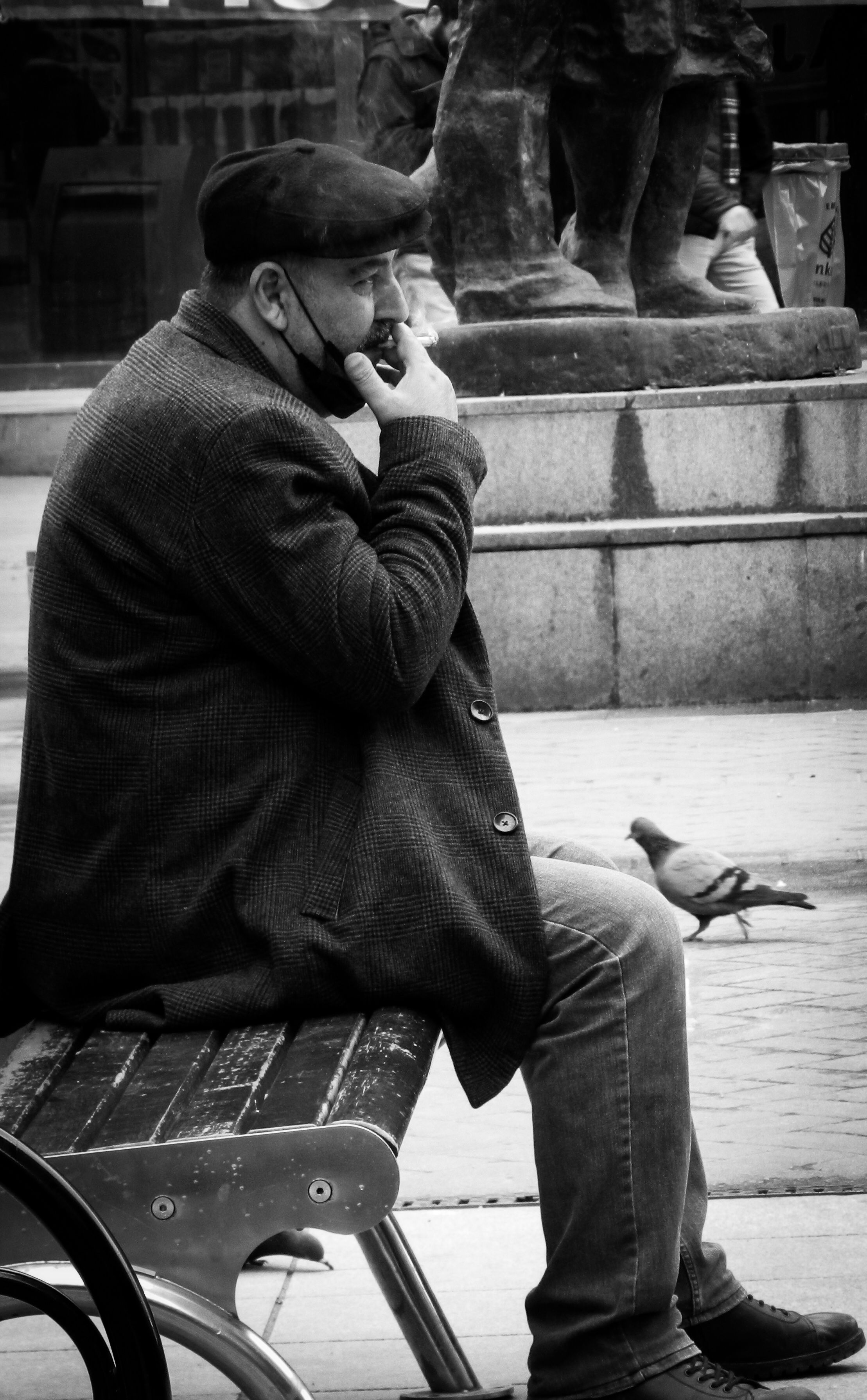 Man Standing and Smoking on Road · Free Stock Photo