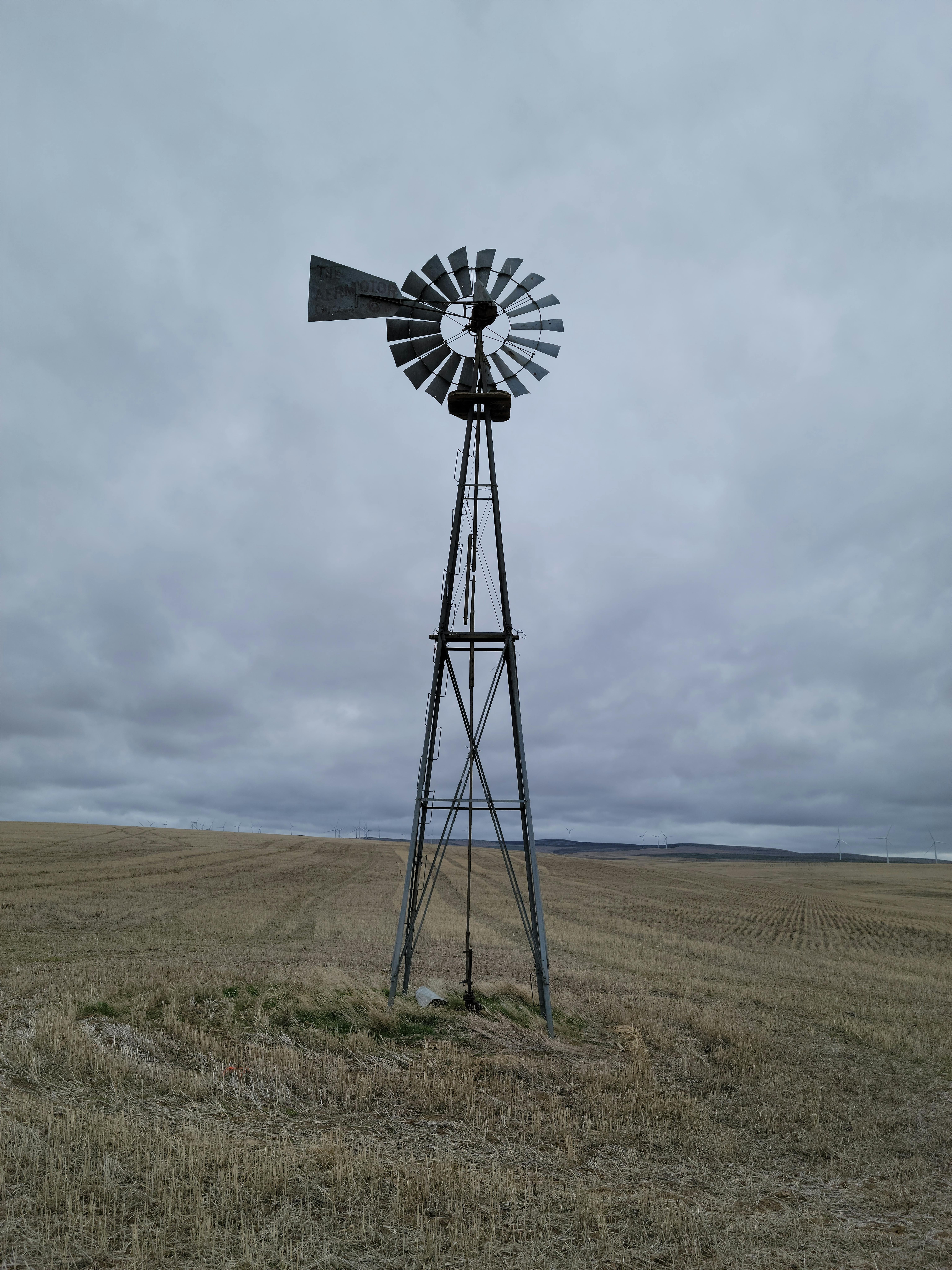 A Windmill in the Farm Field · Free Stock Photo