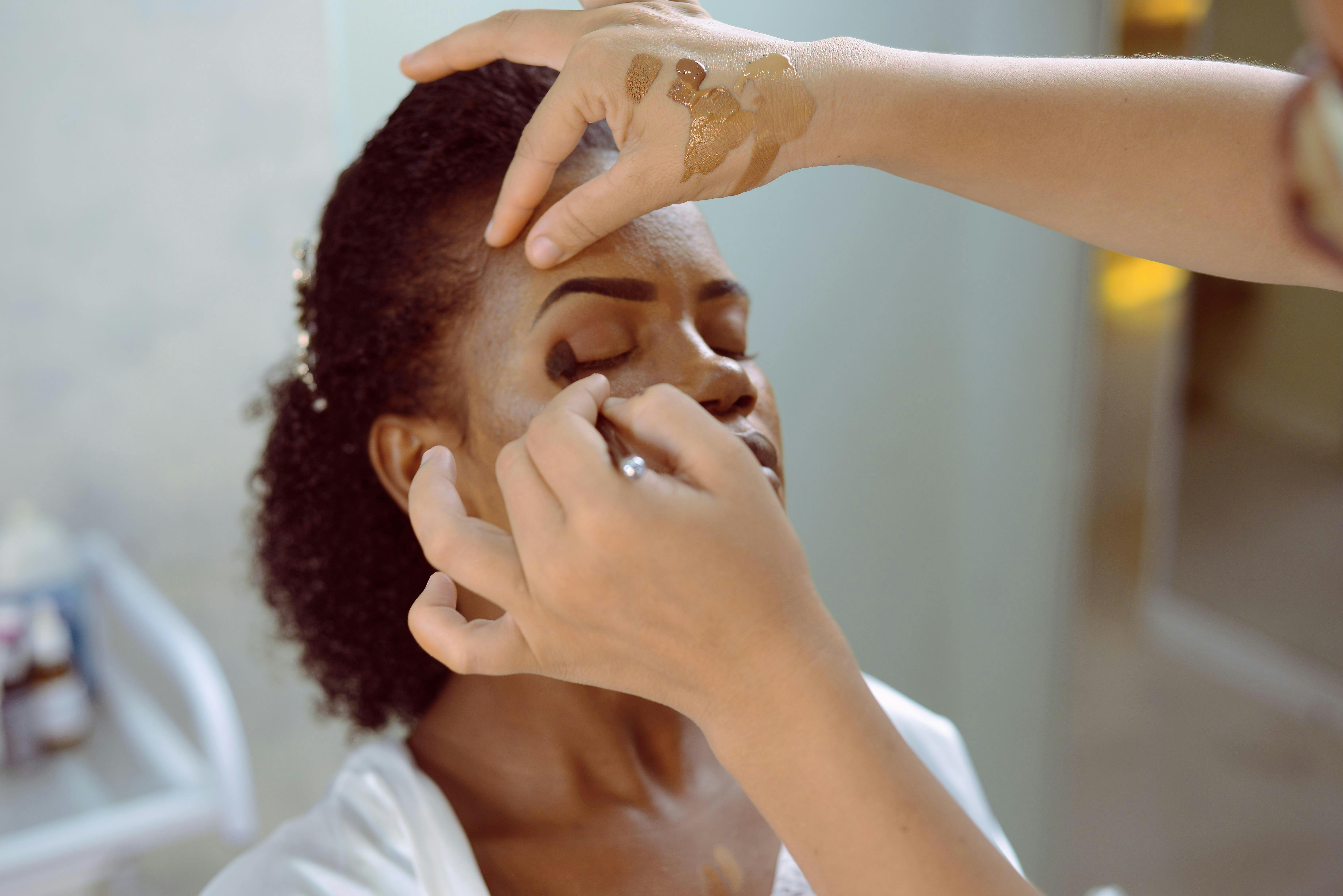 Two Females Wearing Strong Make Up and Costumes · Free Stock Photo