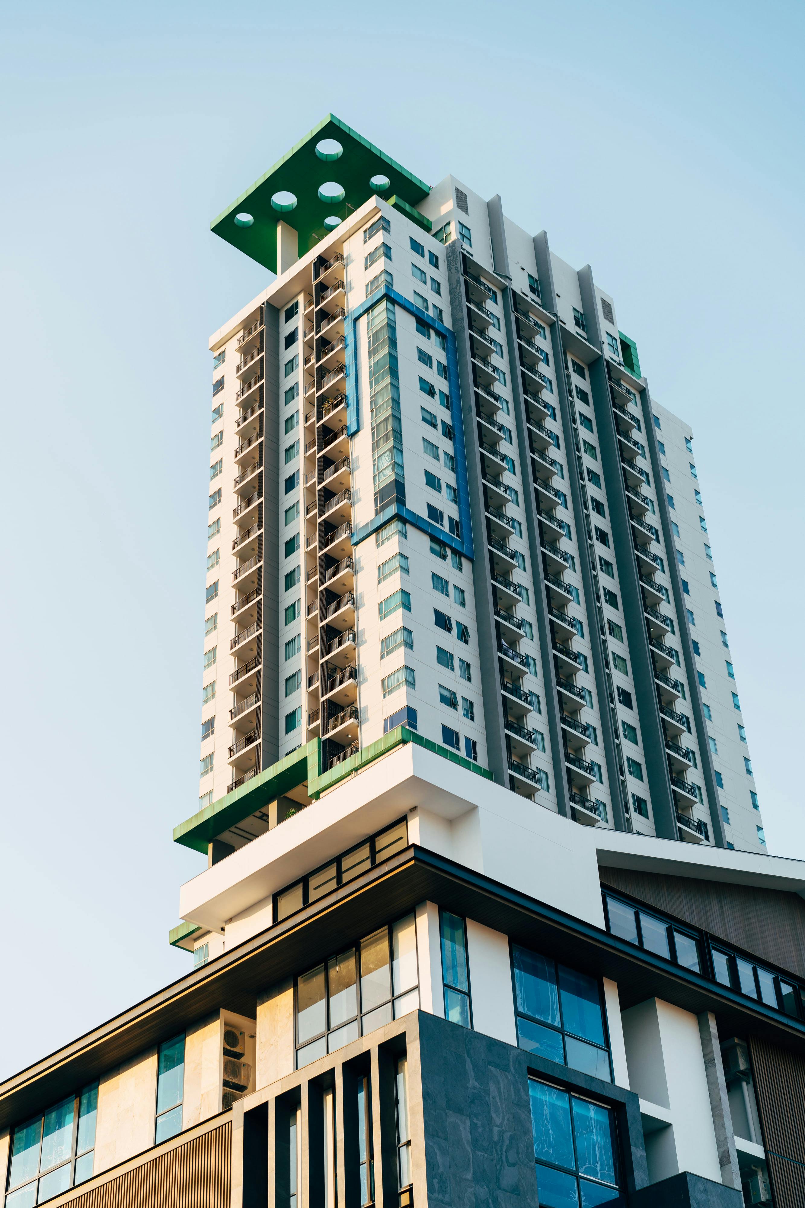 Low Angle Glass High Rise Building · Free Stock Photo
