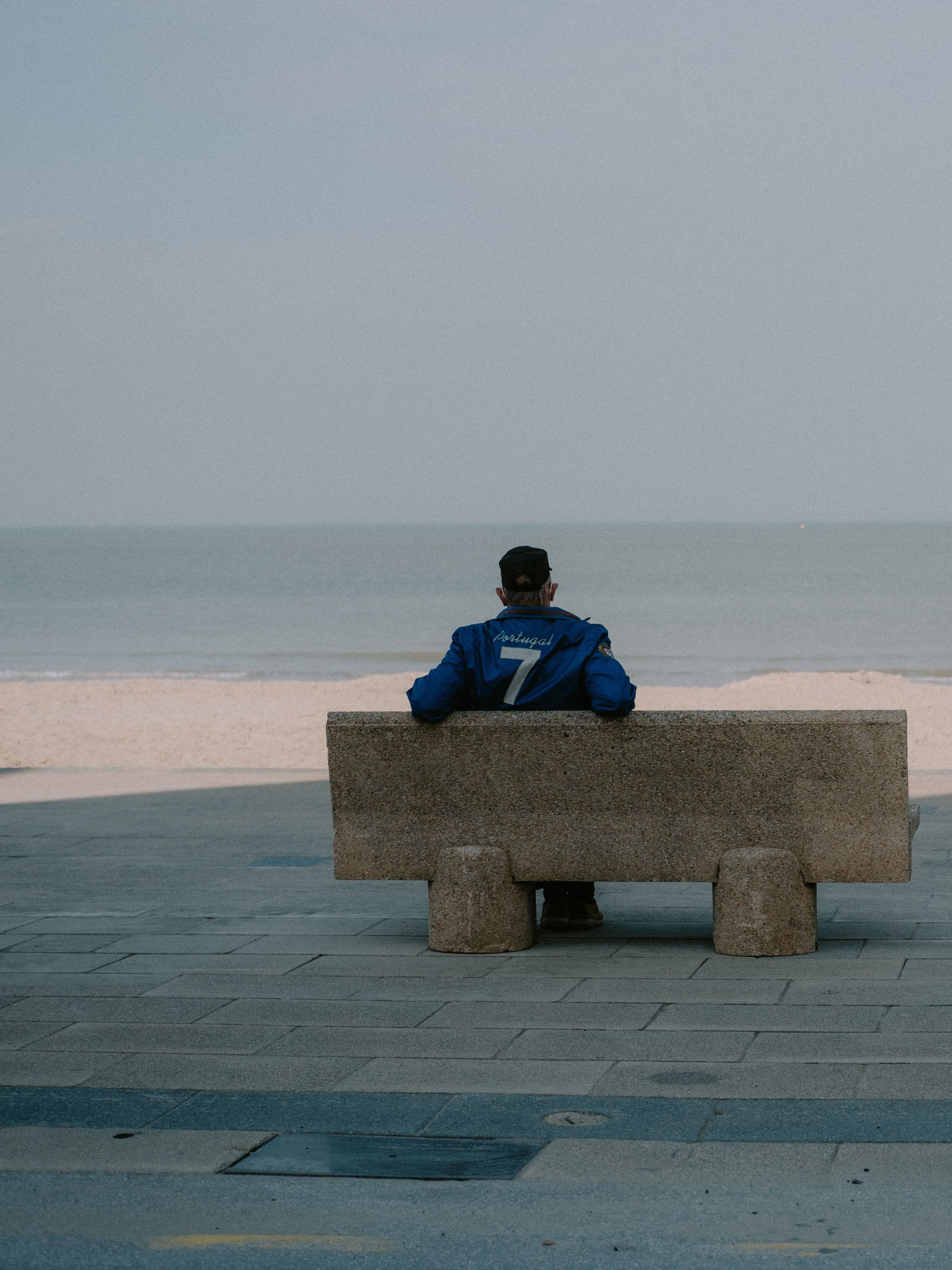 Active Man Sitting On A Bench At Beach Photos, Download The BEST Free ...