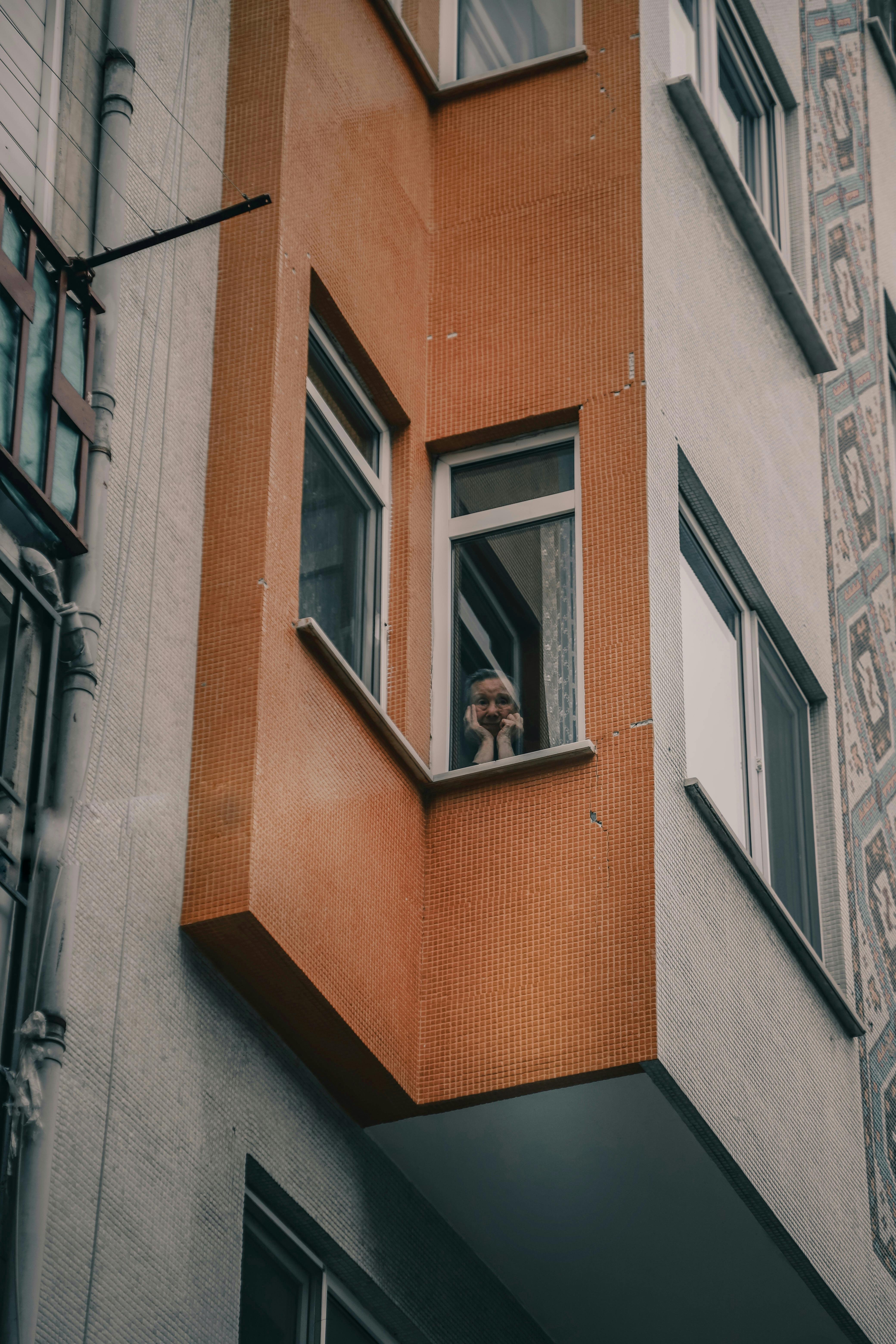 Person Looking Outside the Window · Free Stock Photo