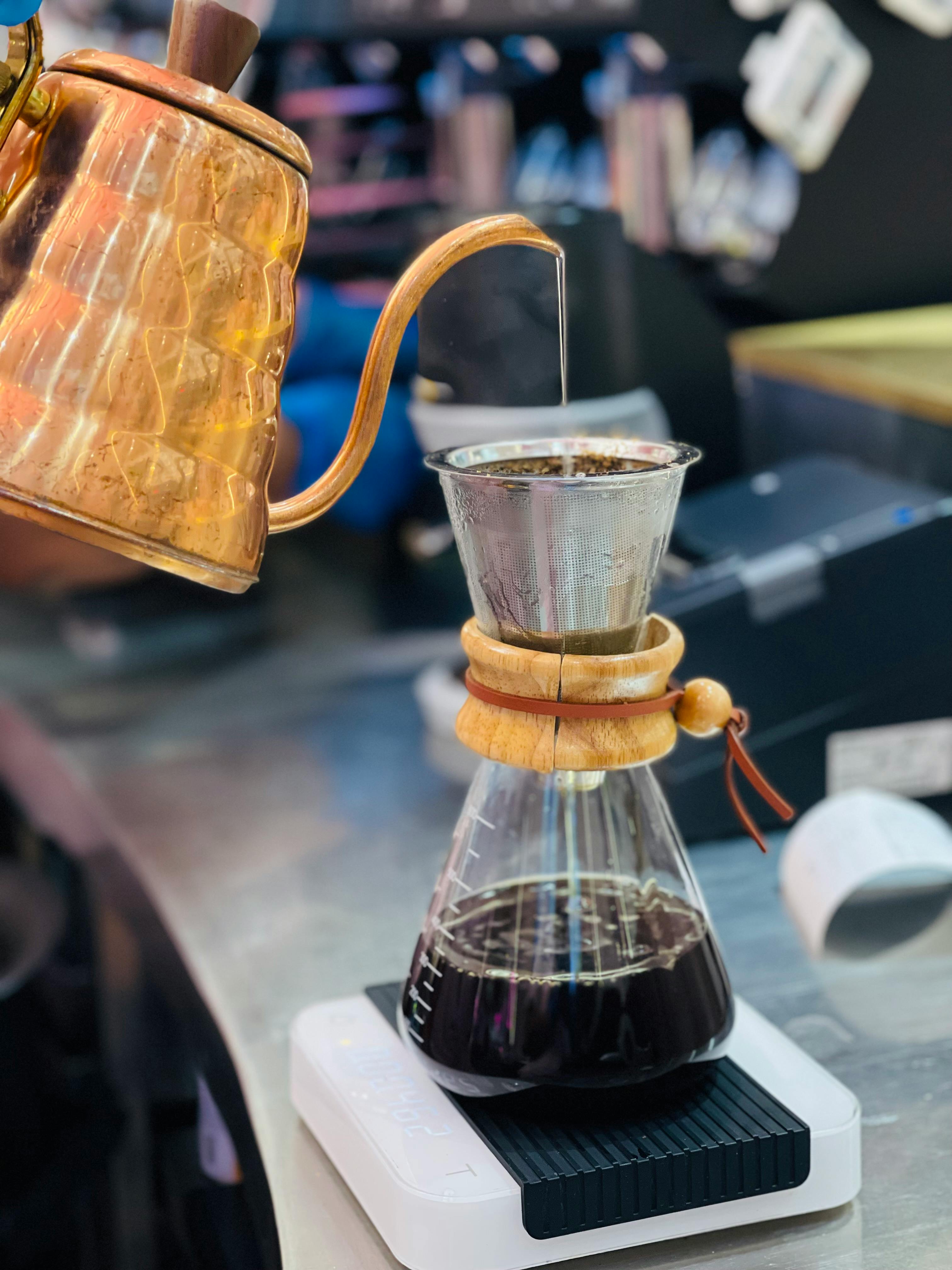 Chemex pot on rock in mountains · Free Stock Photo