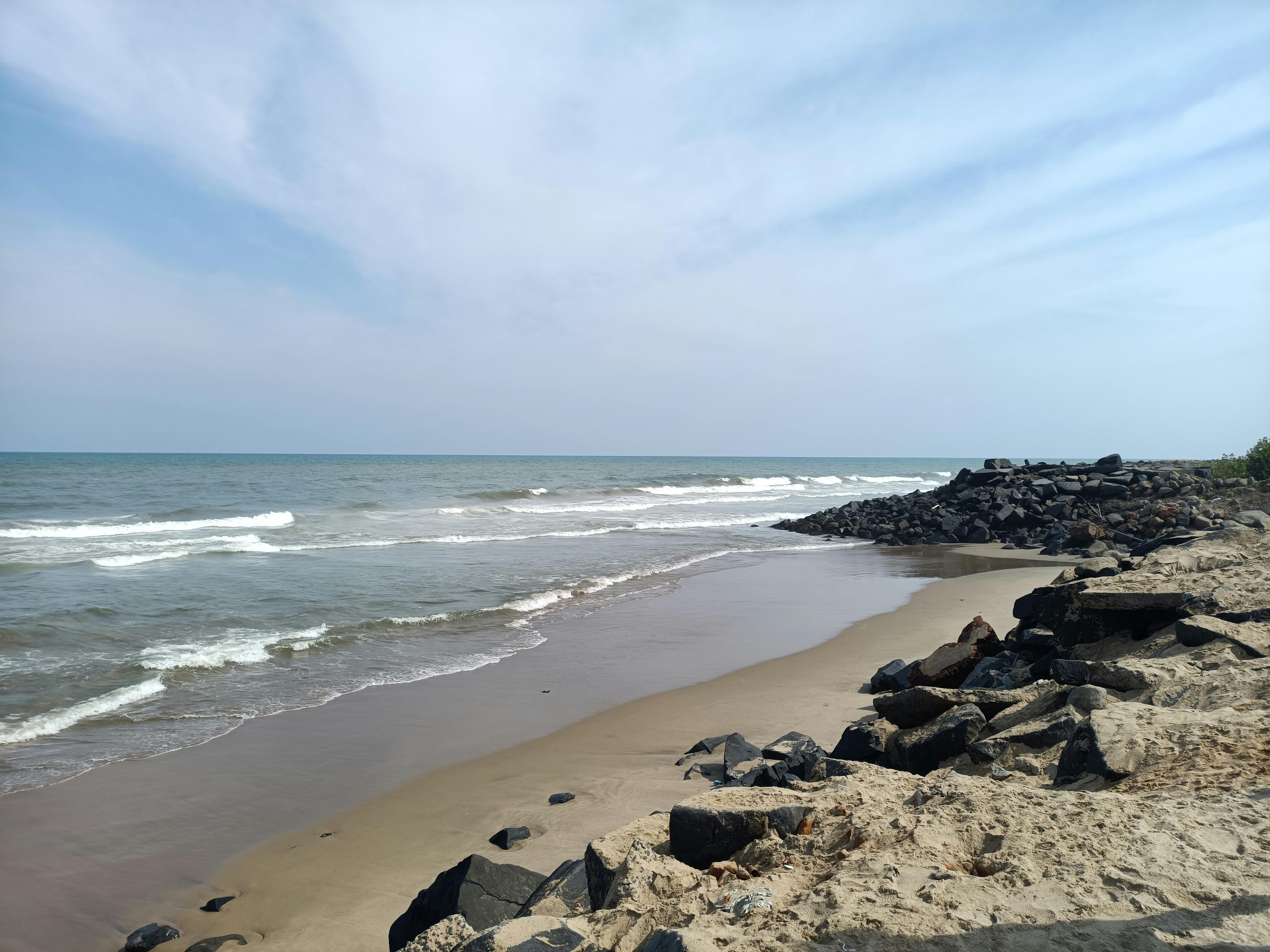 Brown Sand Beach Under Beautiful Sky · Free Stock Photo