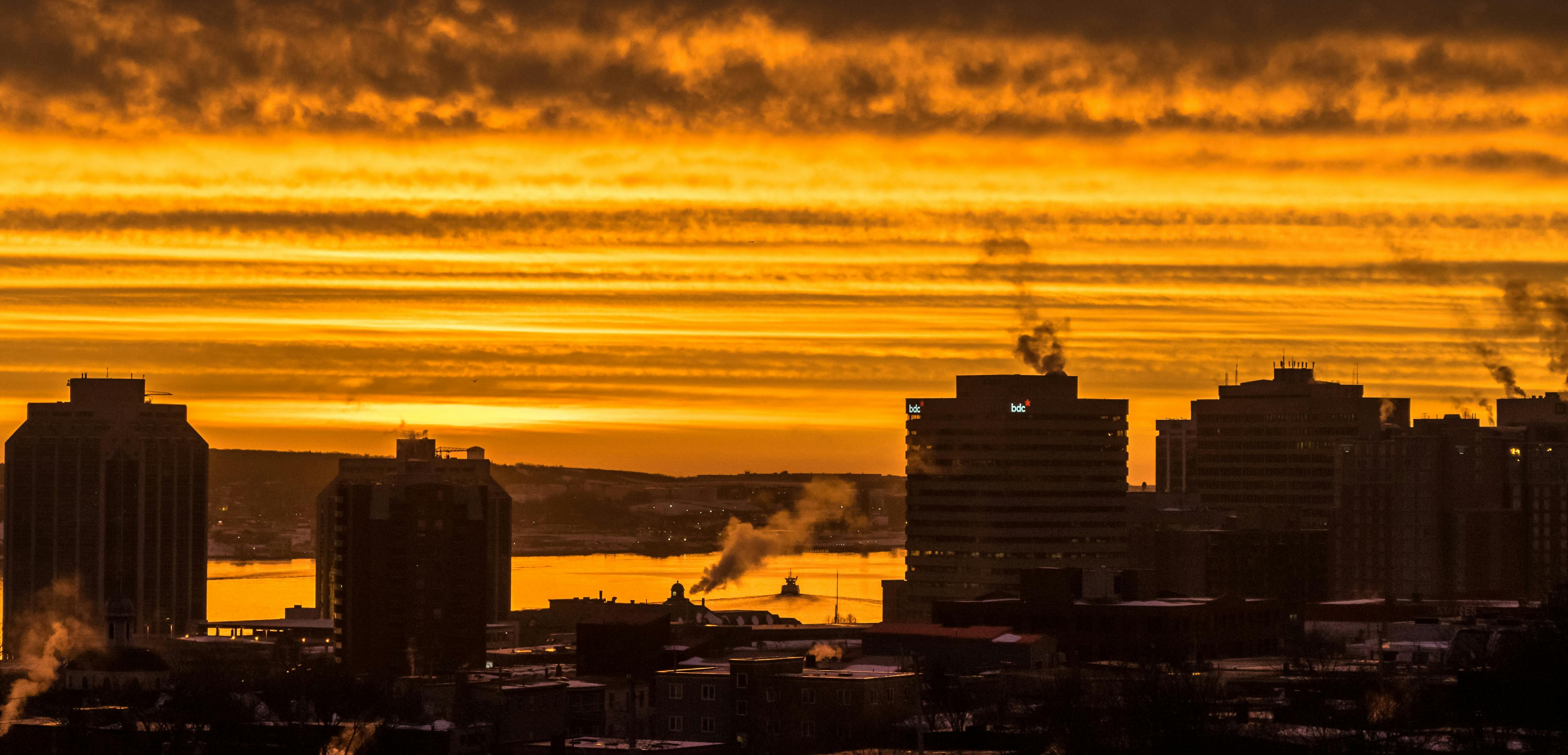Silhouette of Buildings during Sunset · Free Stock Photo