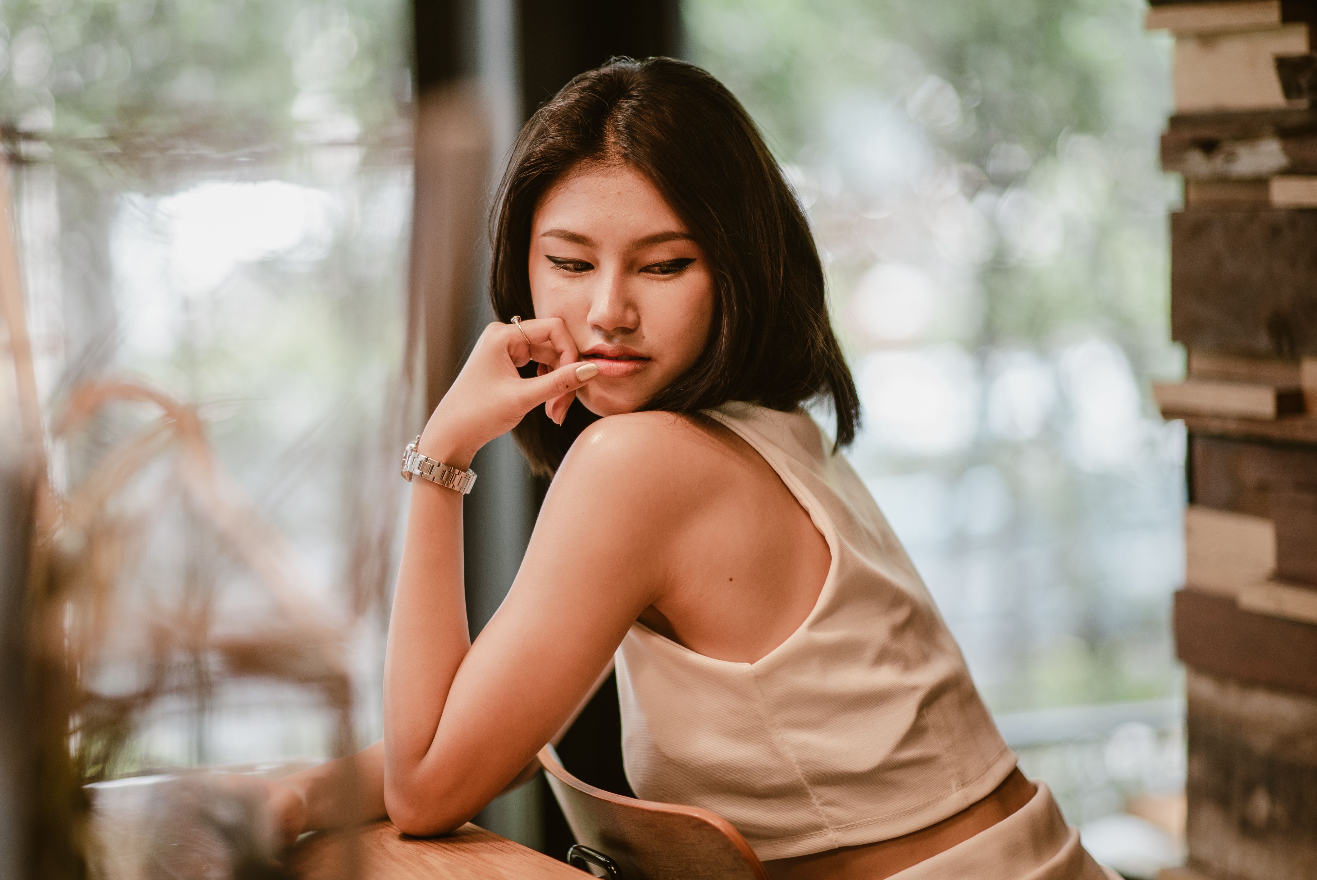 Woman in White and Pink Top Looking Over Shoulder · Free Stock Photo
