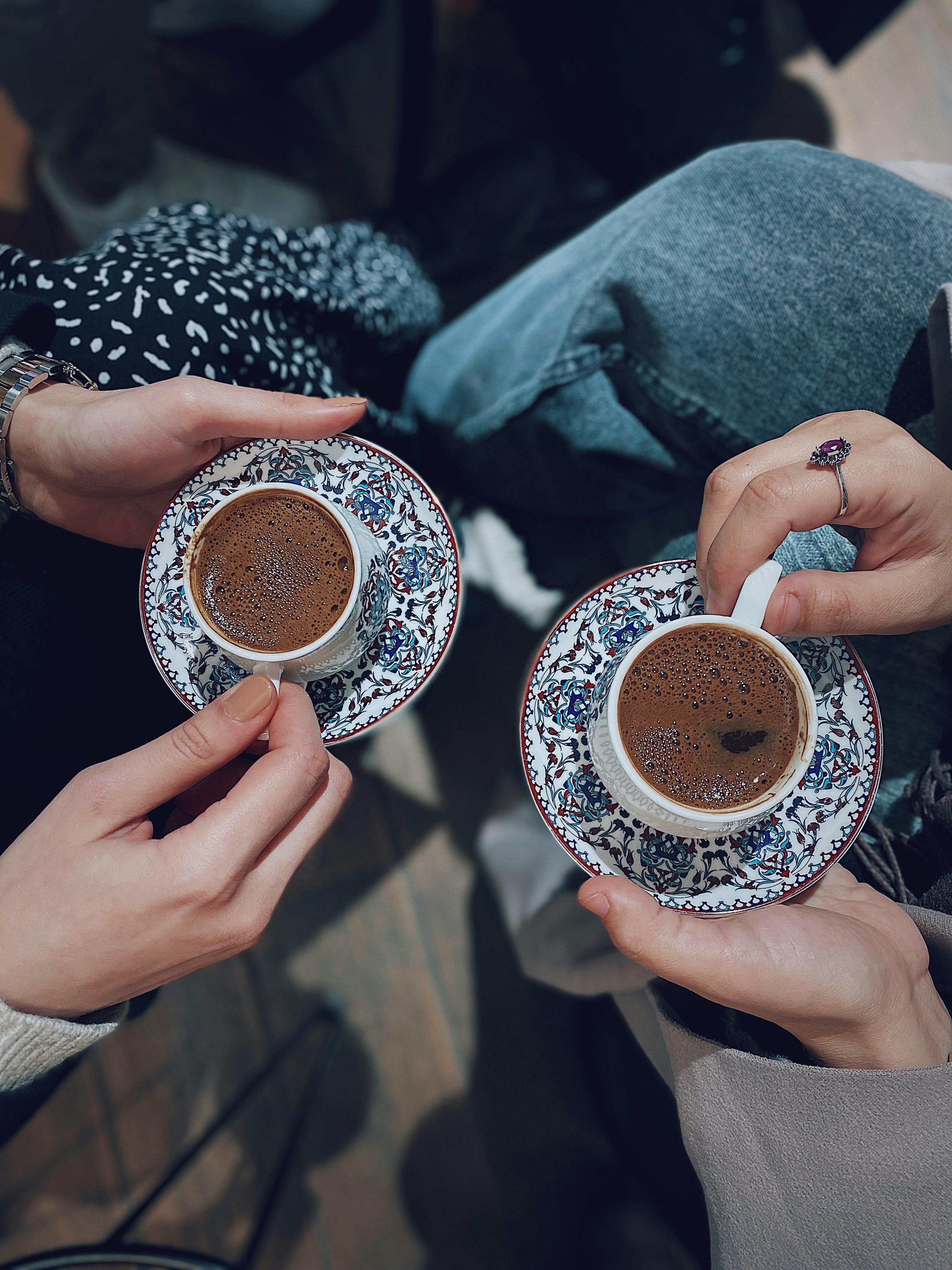 Two People Drinking Coffee · Free Stock Photo