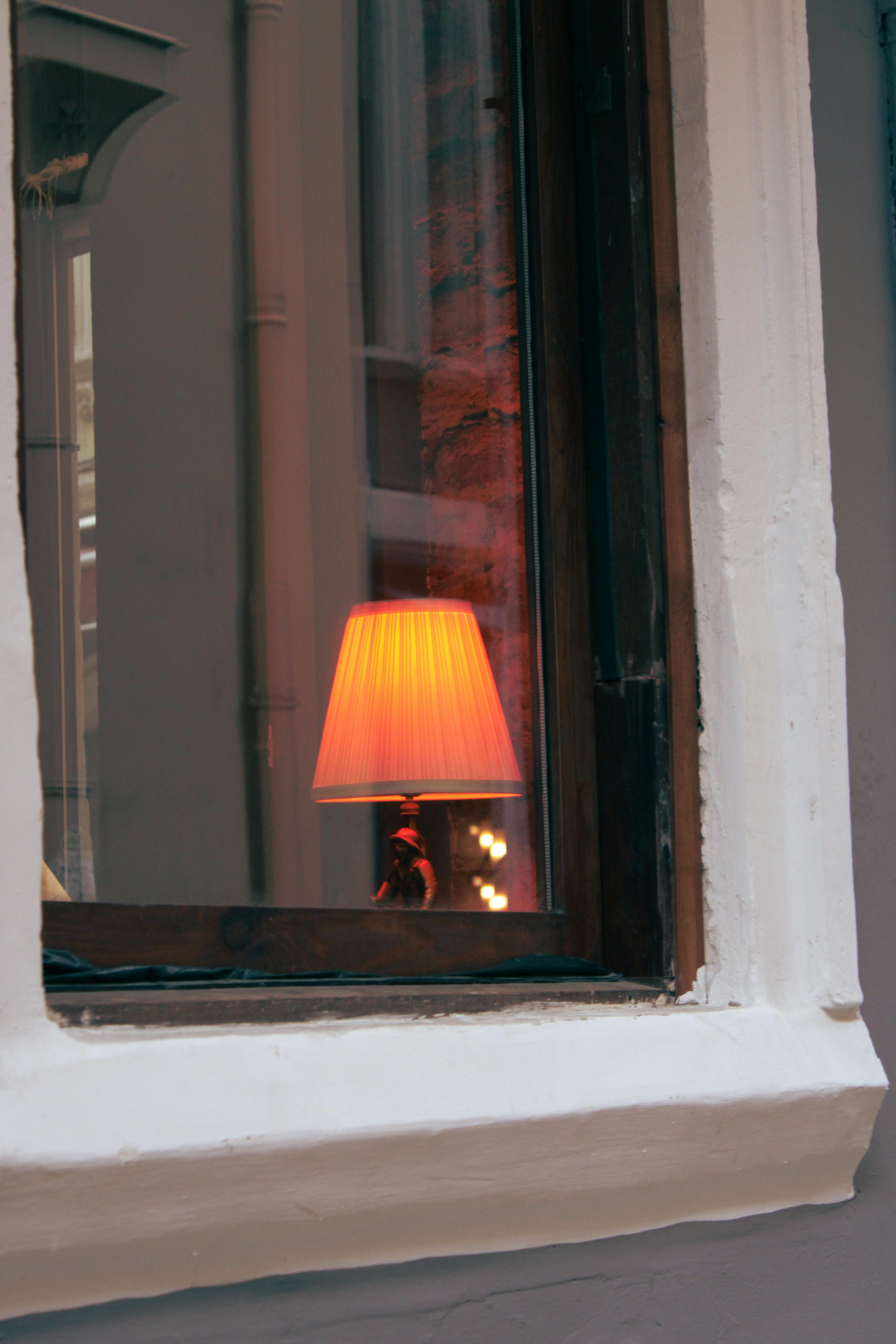 Lamp Turned On Near Window · Free Stock Photo