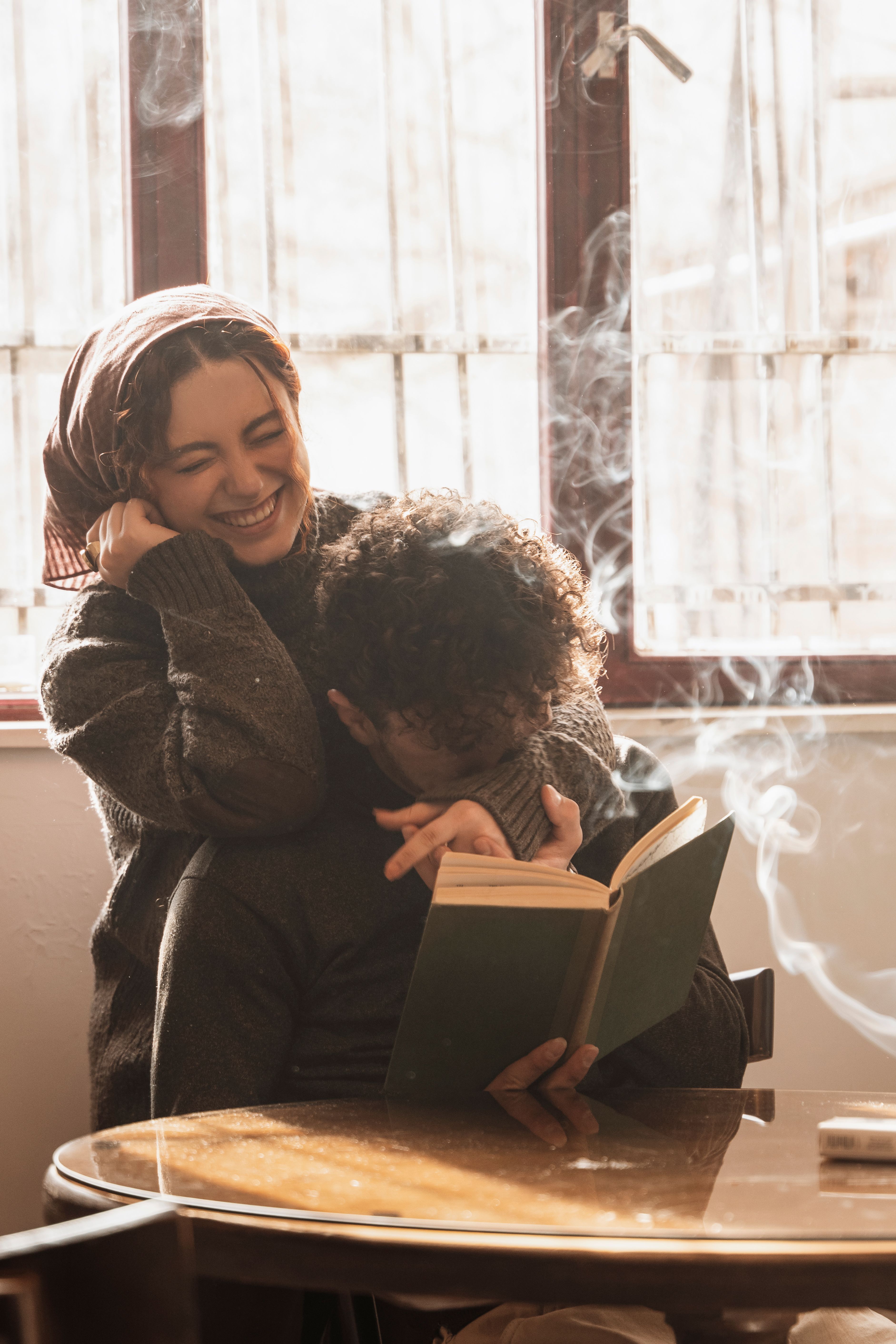 Happy Couple Reading Book Together · Free Stock Photo