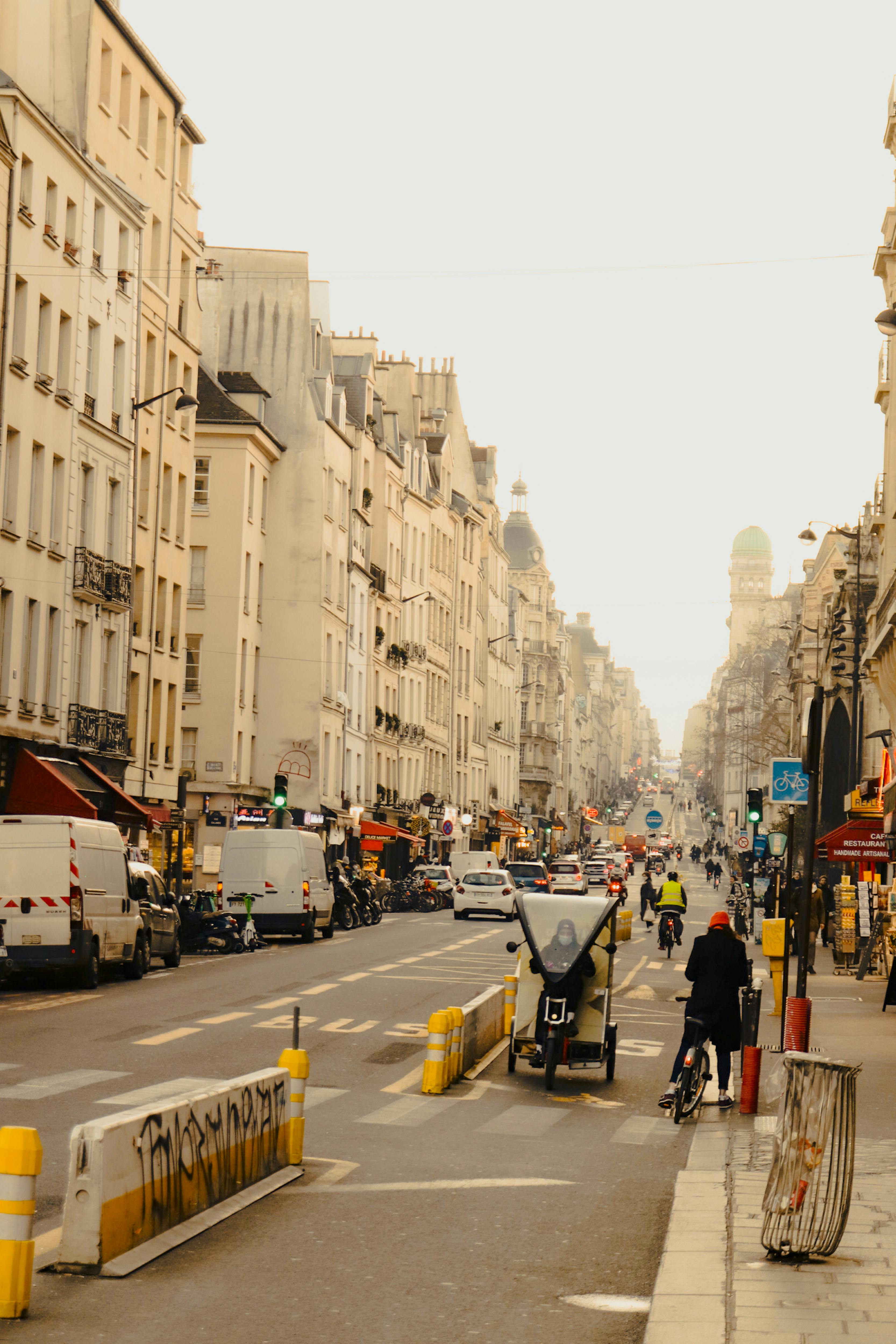 Busy Road Between City Buildings · Free Stock Photo