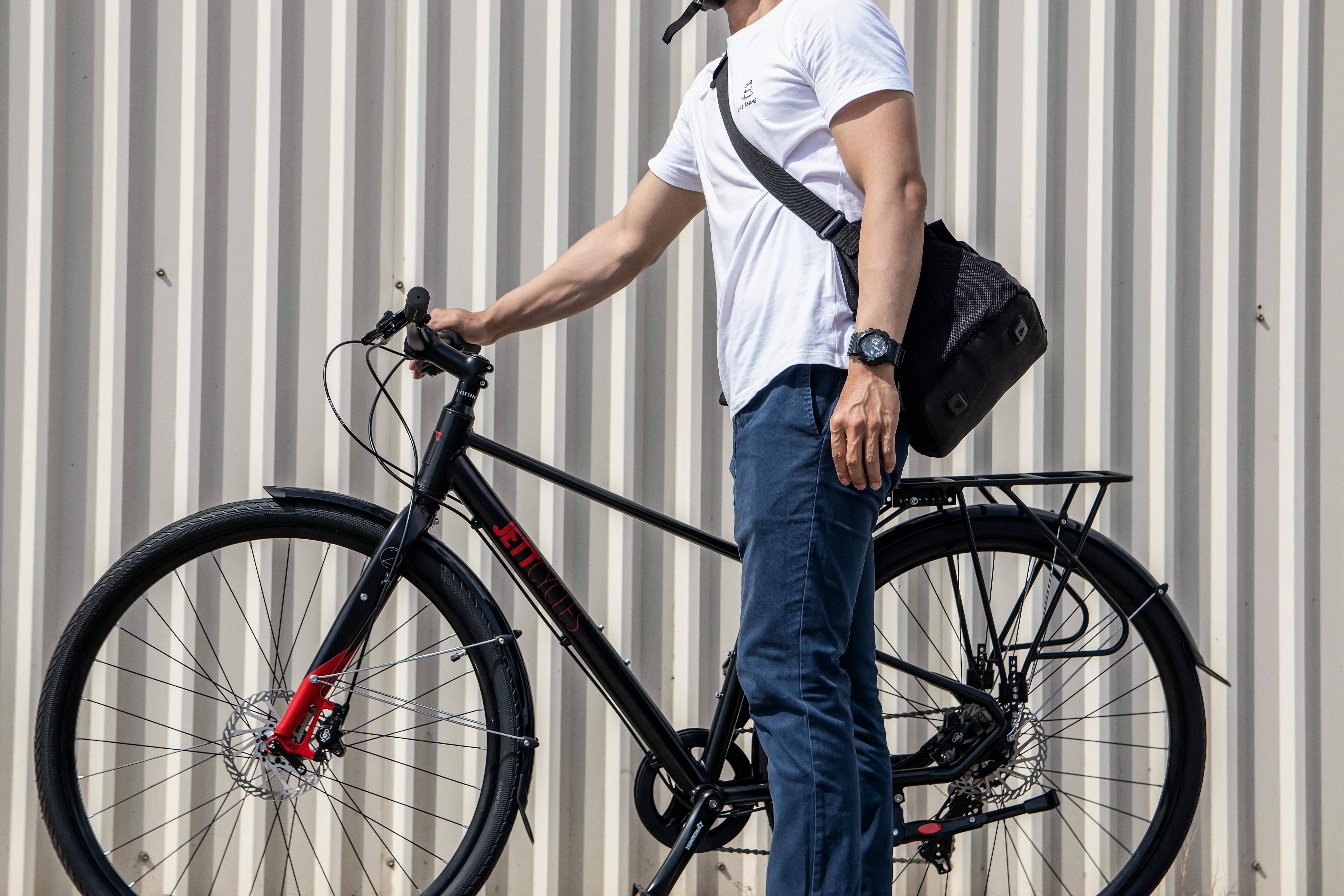 A Person Standing Beside His Bicycle · Free Stock Photo