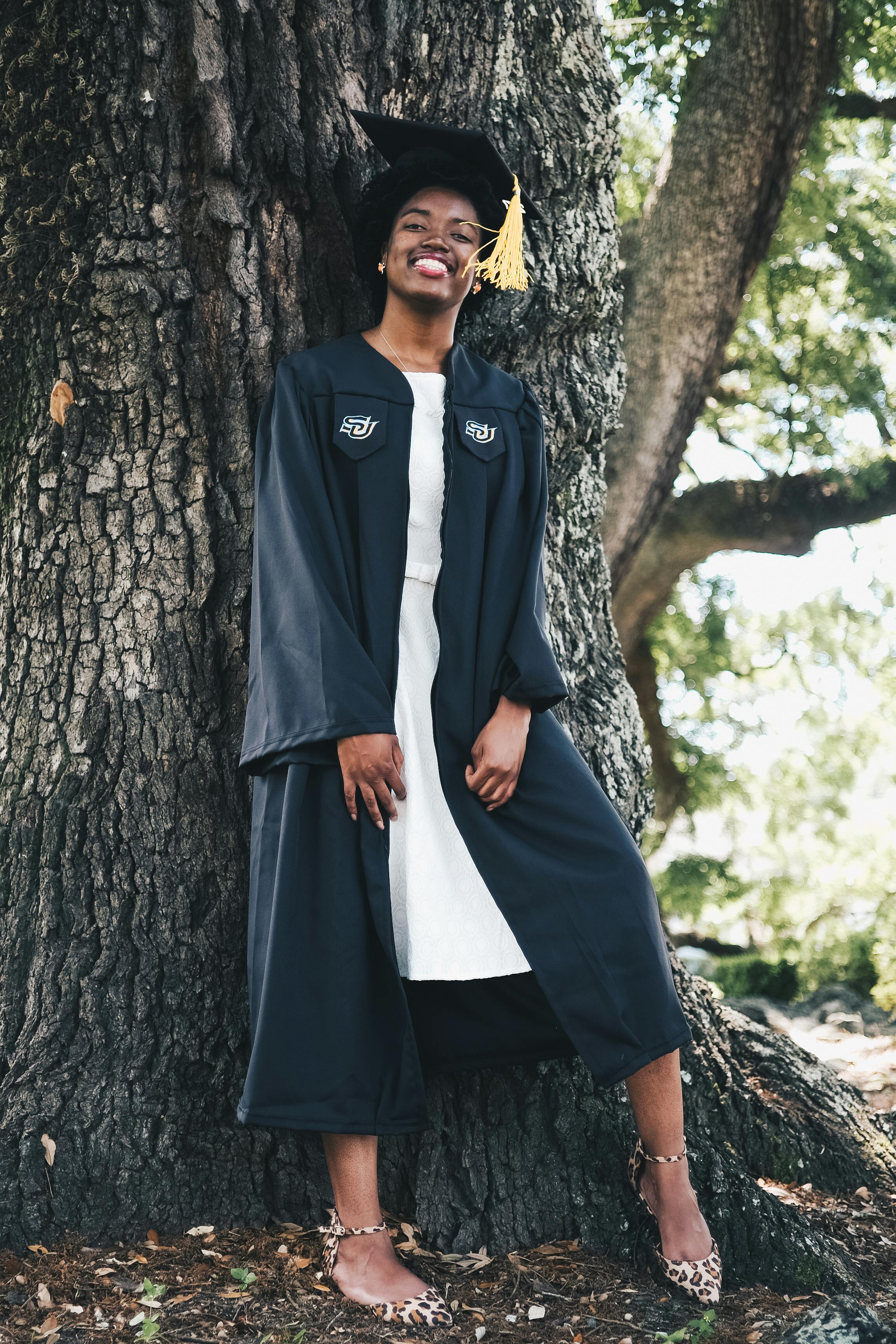 A Woman in Her Graduation Toga · Free Stock Photo