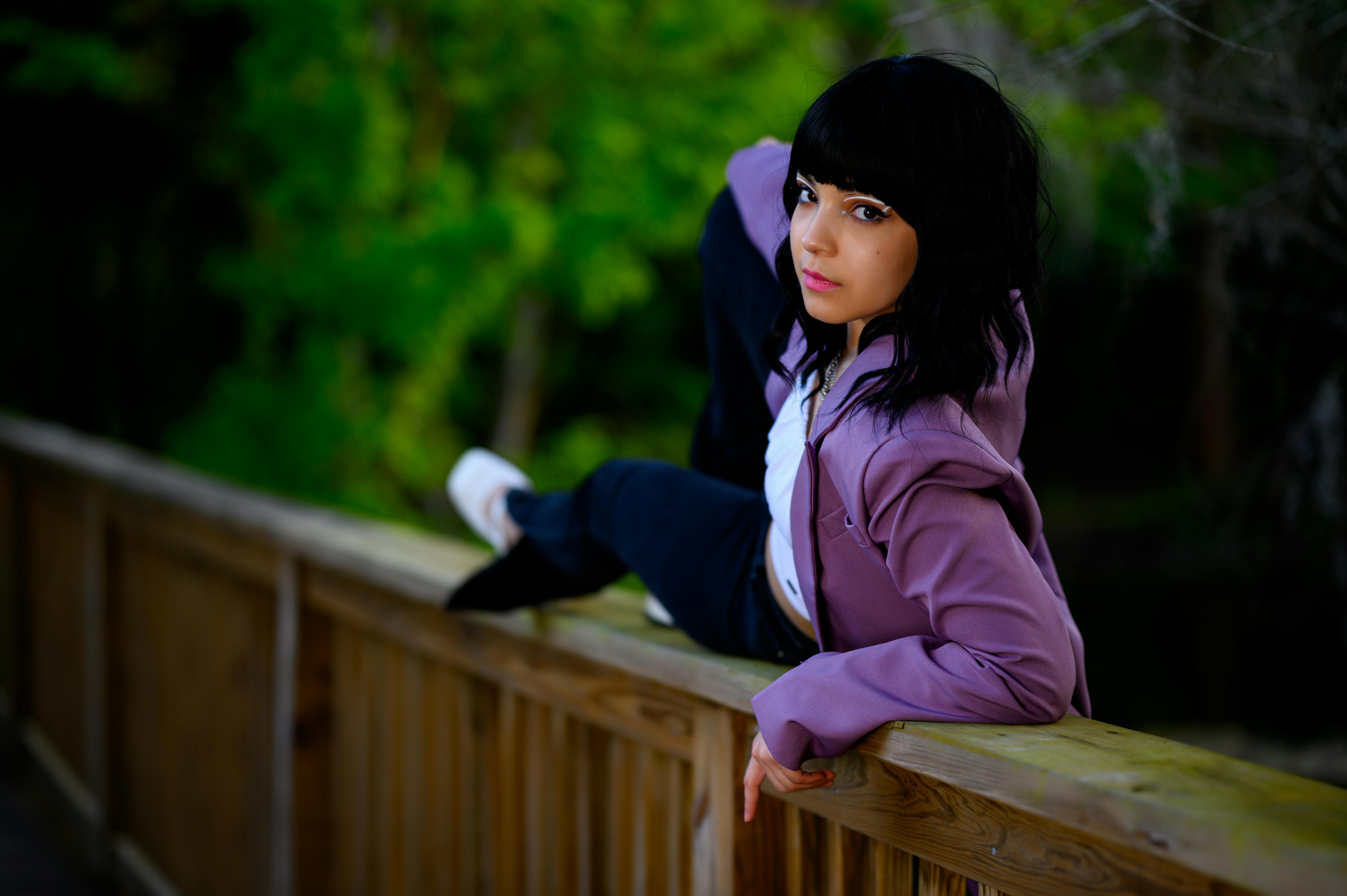 Woman Lying on Railing · Free Stock Photo